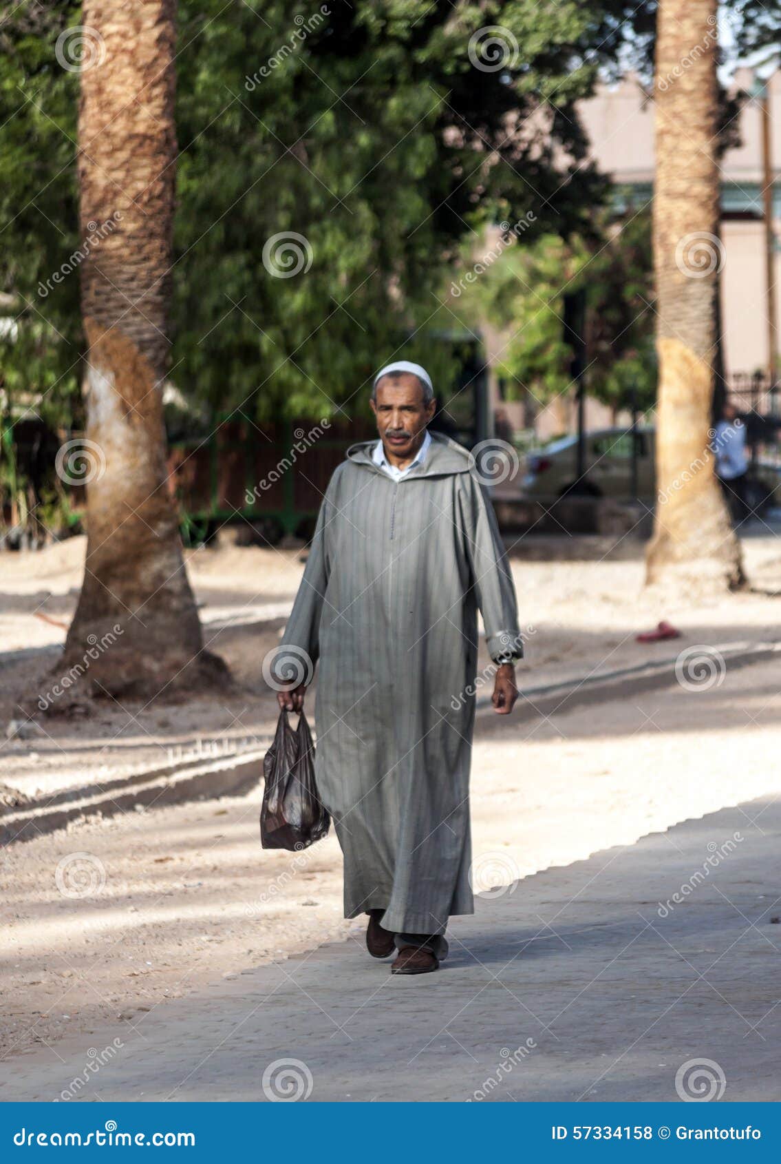 Muslim man walking editorial stock photo. Image of lonely - 57334158