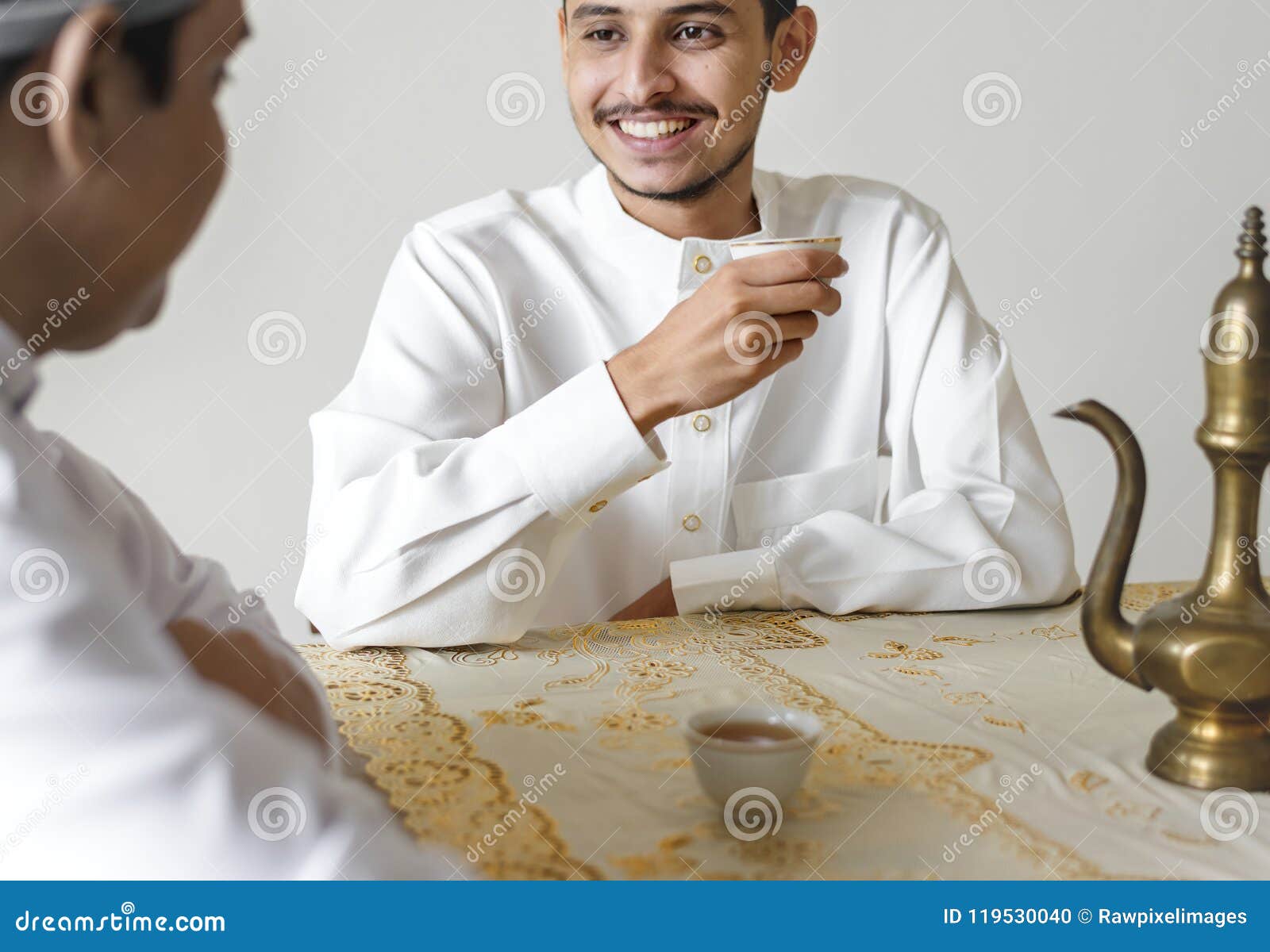 Muslim Men Having a Cup of Tea Stock Photo - Image of cultural, drink ...