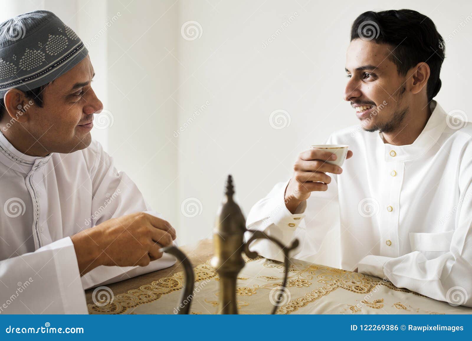 Muslim Men Having Tea Together Stock Photo - Image of cheerful, middle ...