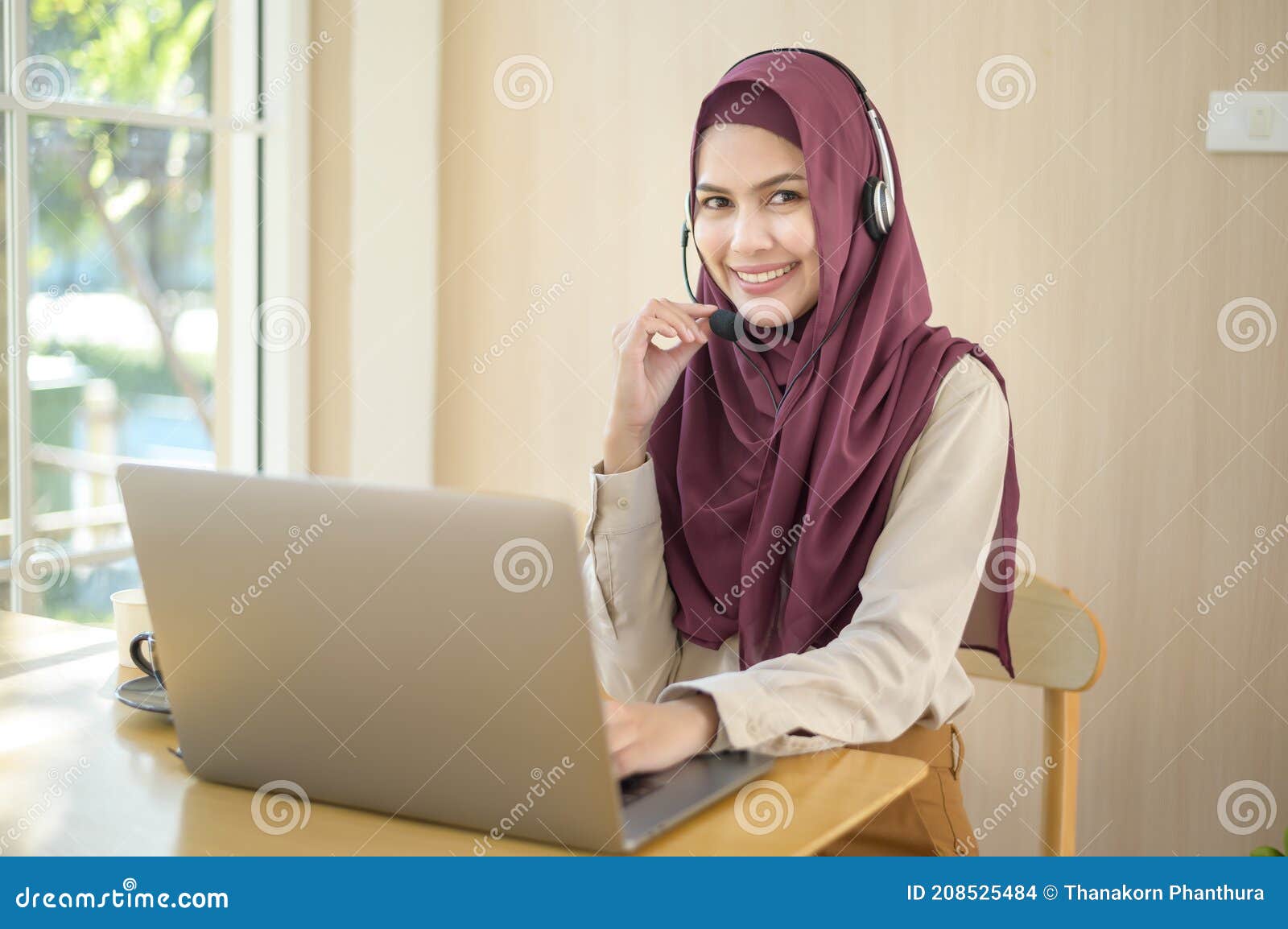 Muslim Operator Woman in Headset Using Computer Answering Customer Call ...