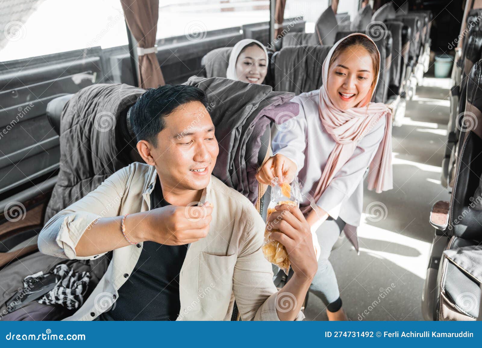 Passengers Sharing Snacks with Other while Road Trip on the Bus Stock ...