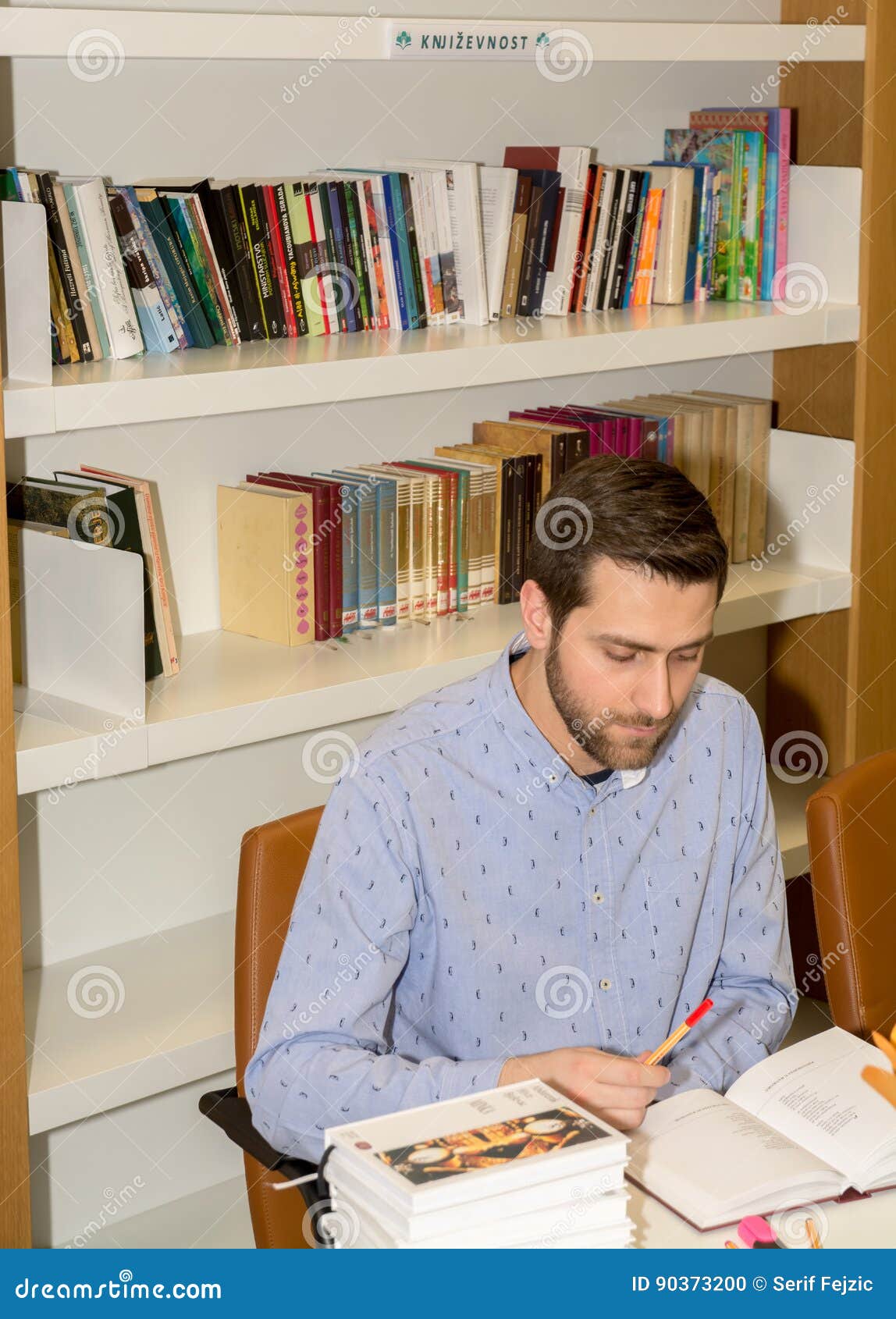 Muslim student in library stock photo. Image of asian - 90373200