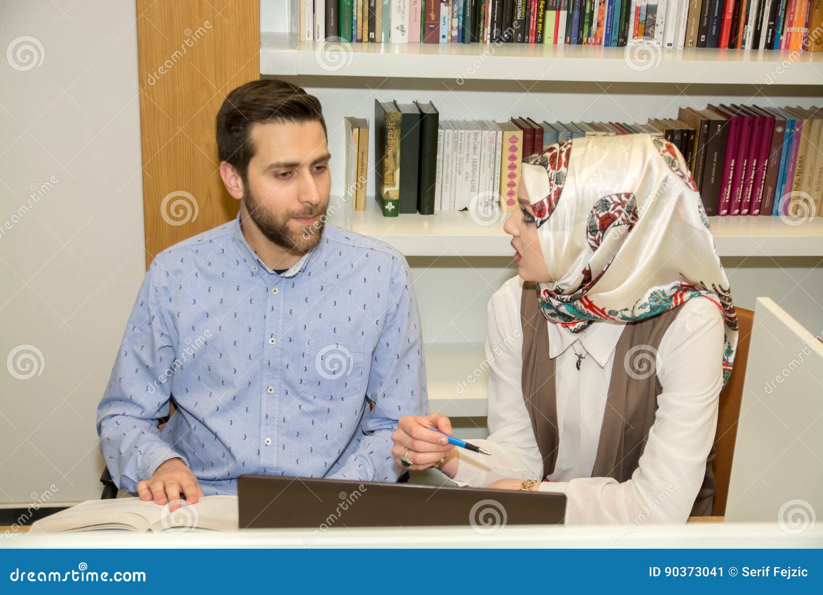 Muslim students in library stock image. Image of asian - 90373041