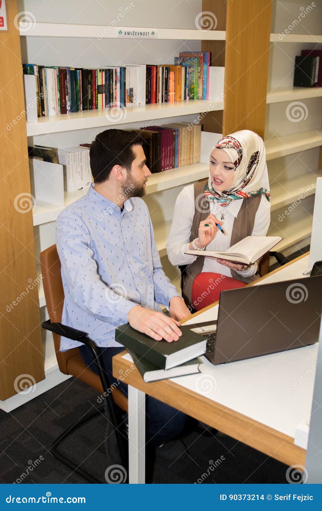 Muslim students in library stock photo. Image of happy - 90373214