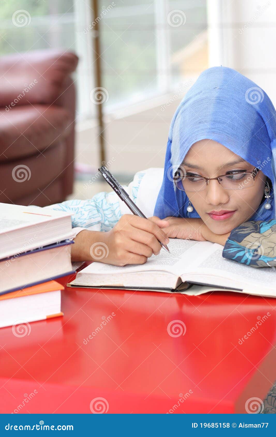 Muslim woman with a book stock photo. Image of asia, classroom - 19685158