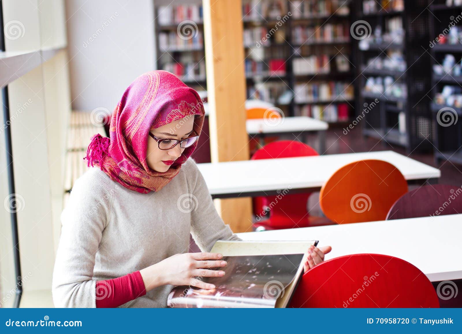 Muslim Woman at the Library Stock Photo - Image of person, girl: 70958720