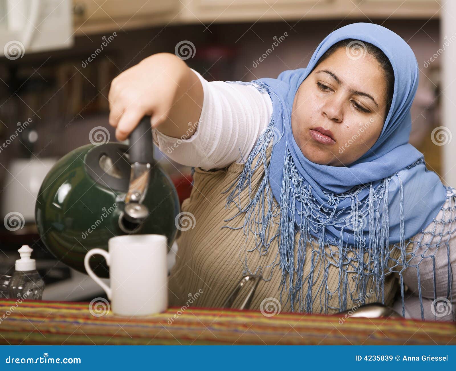 Muslim woman pouring tea stock image. Image of liquid - 4235839