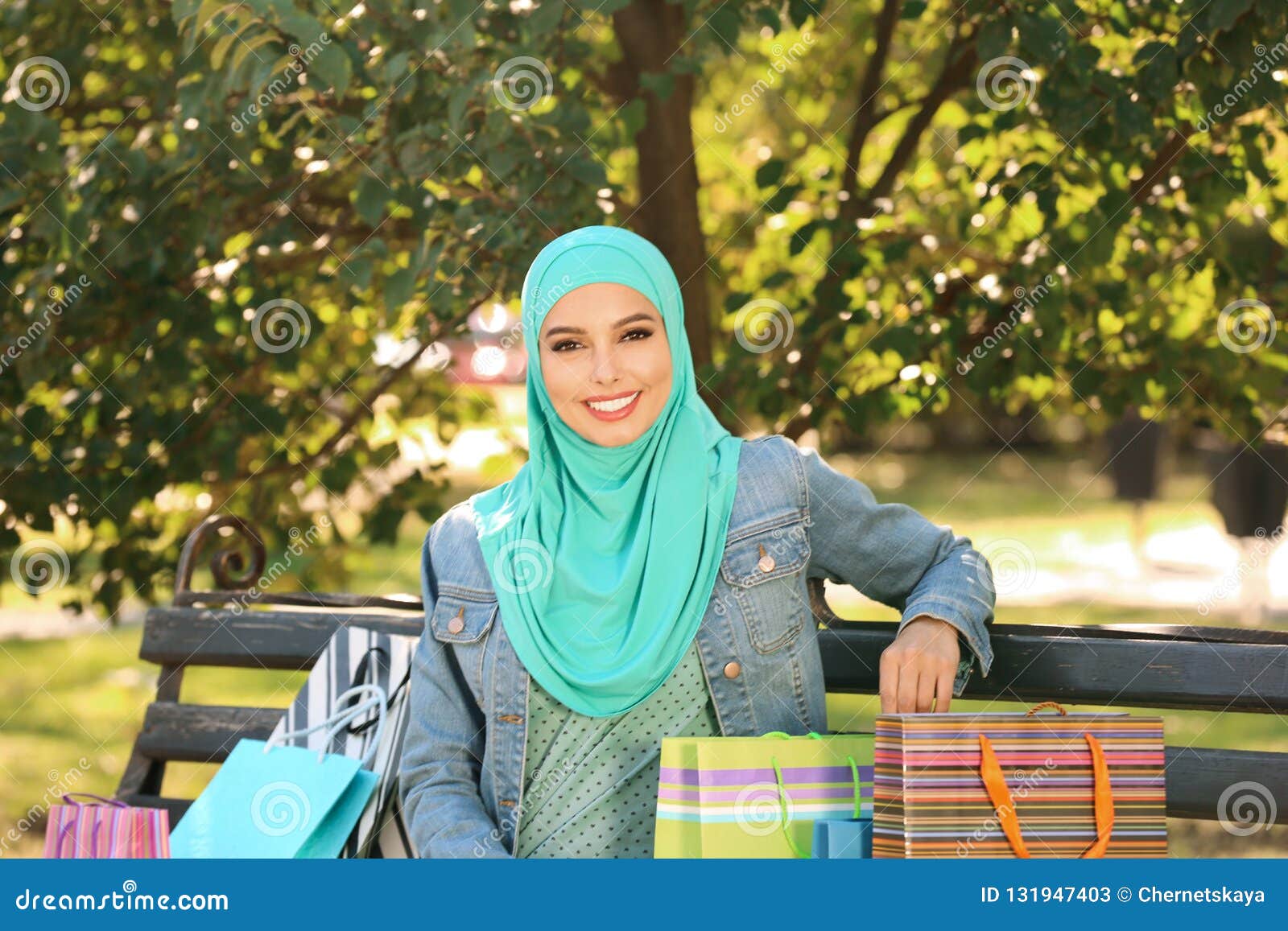 Muslim Woman Sitting on Bench Stock Image - Image of fashion, arabic ...