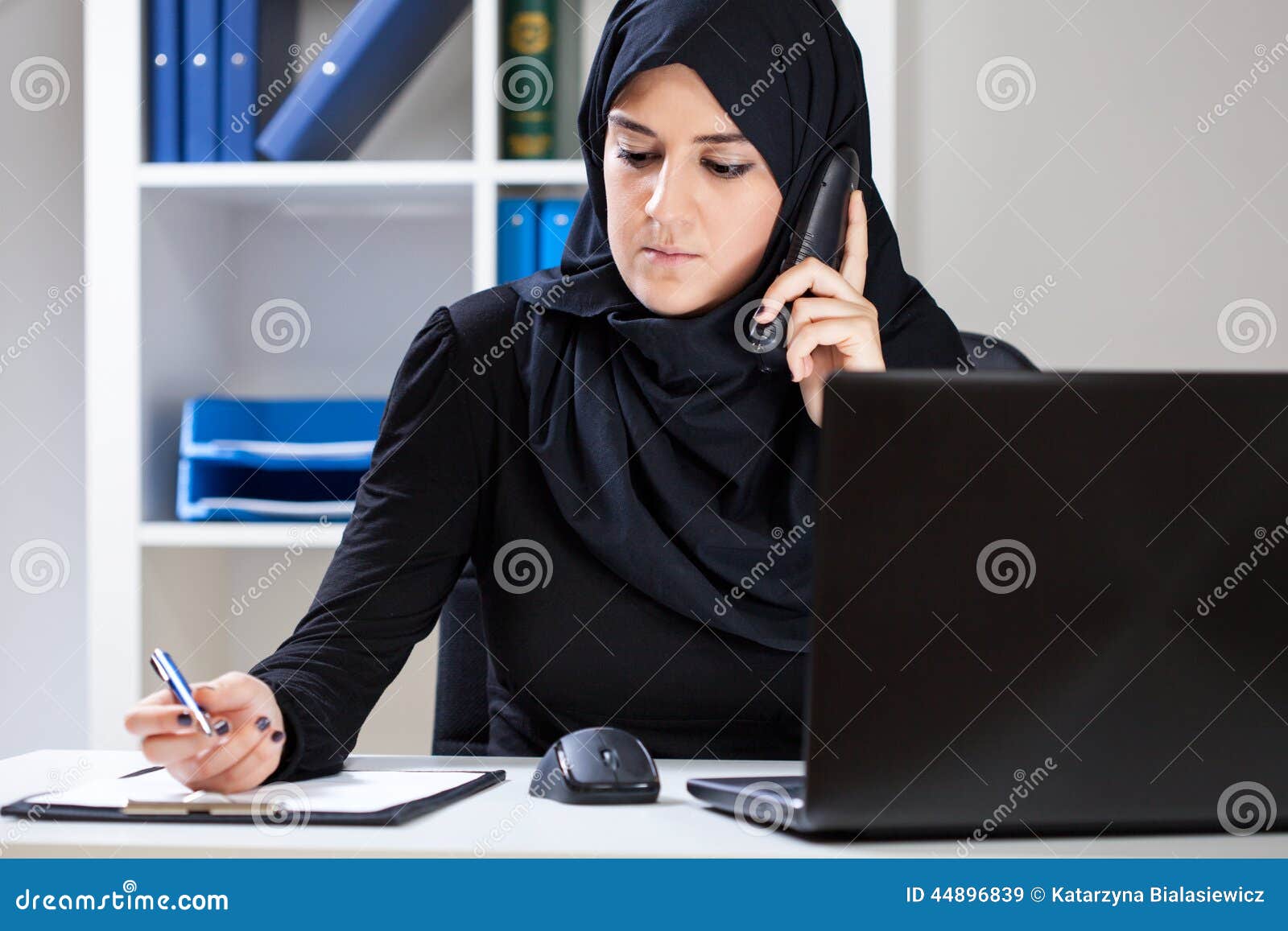 Muslim Woman Working in Office Stock Image - Image of clipboard, arab ...