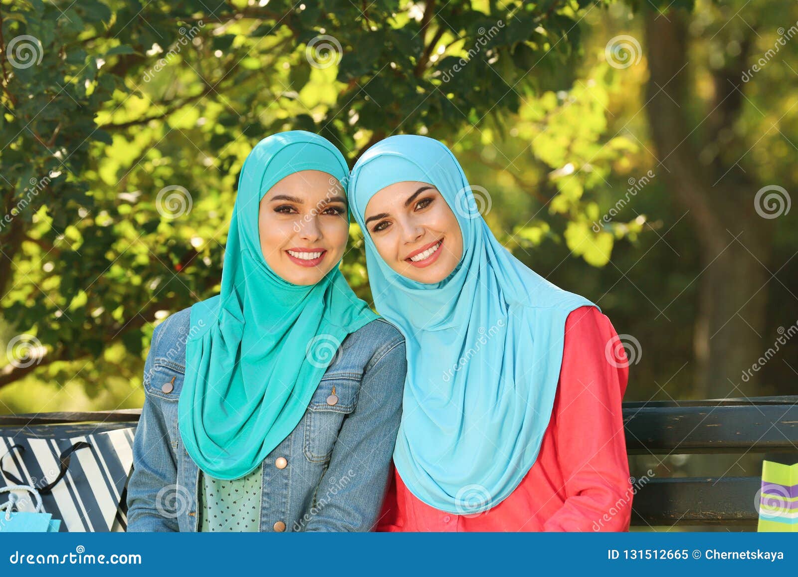 Muslim Women Sitting on Bench Stock Image - Image of beautiful, arabian ...