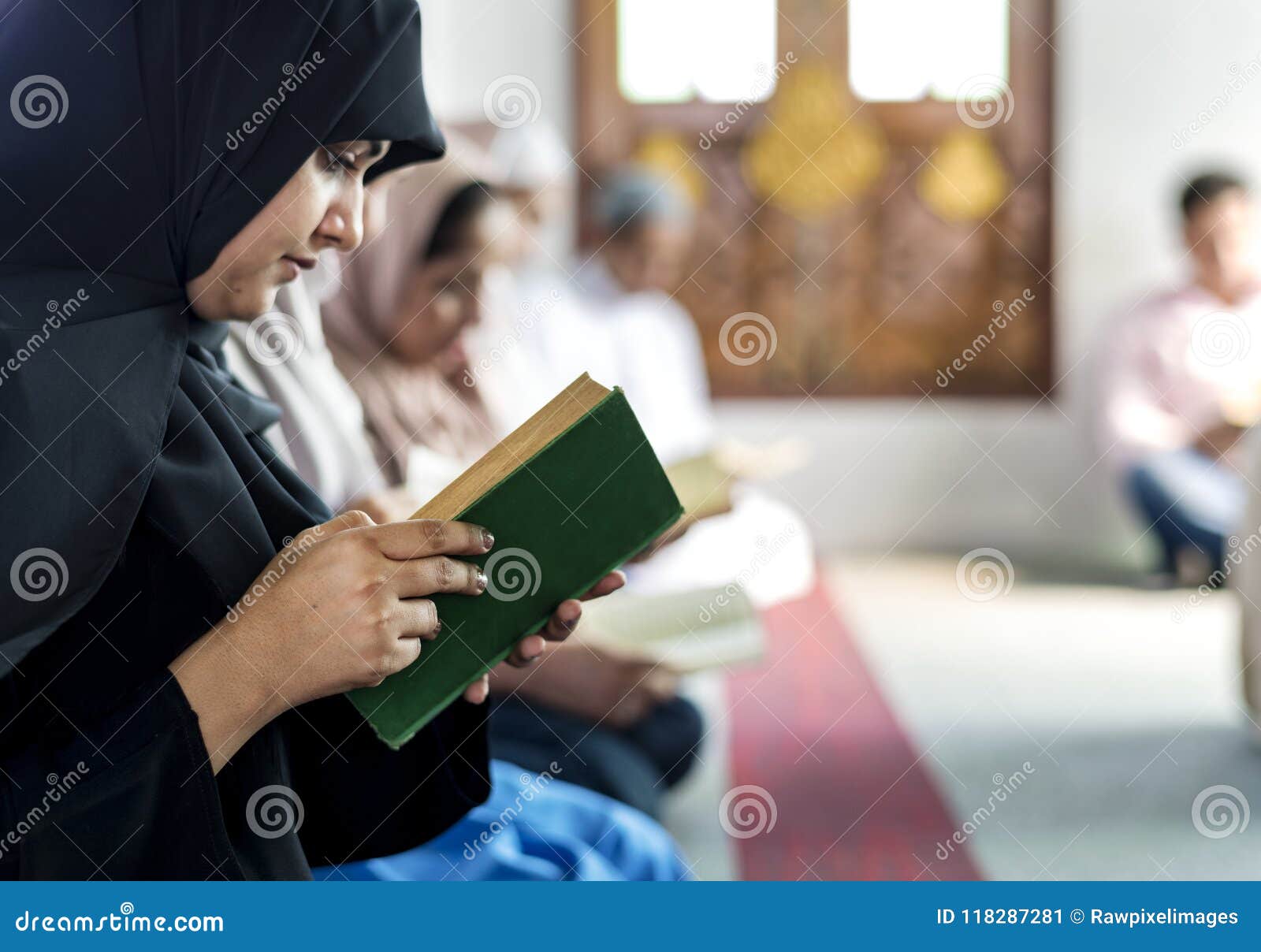 Muslims Reading from the Quran Stock Image - Image of book, hijab ...
