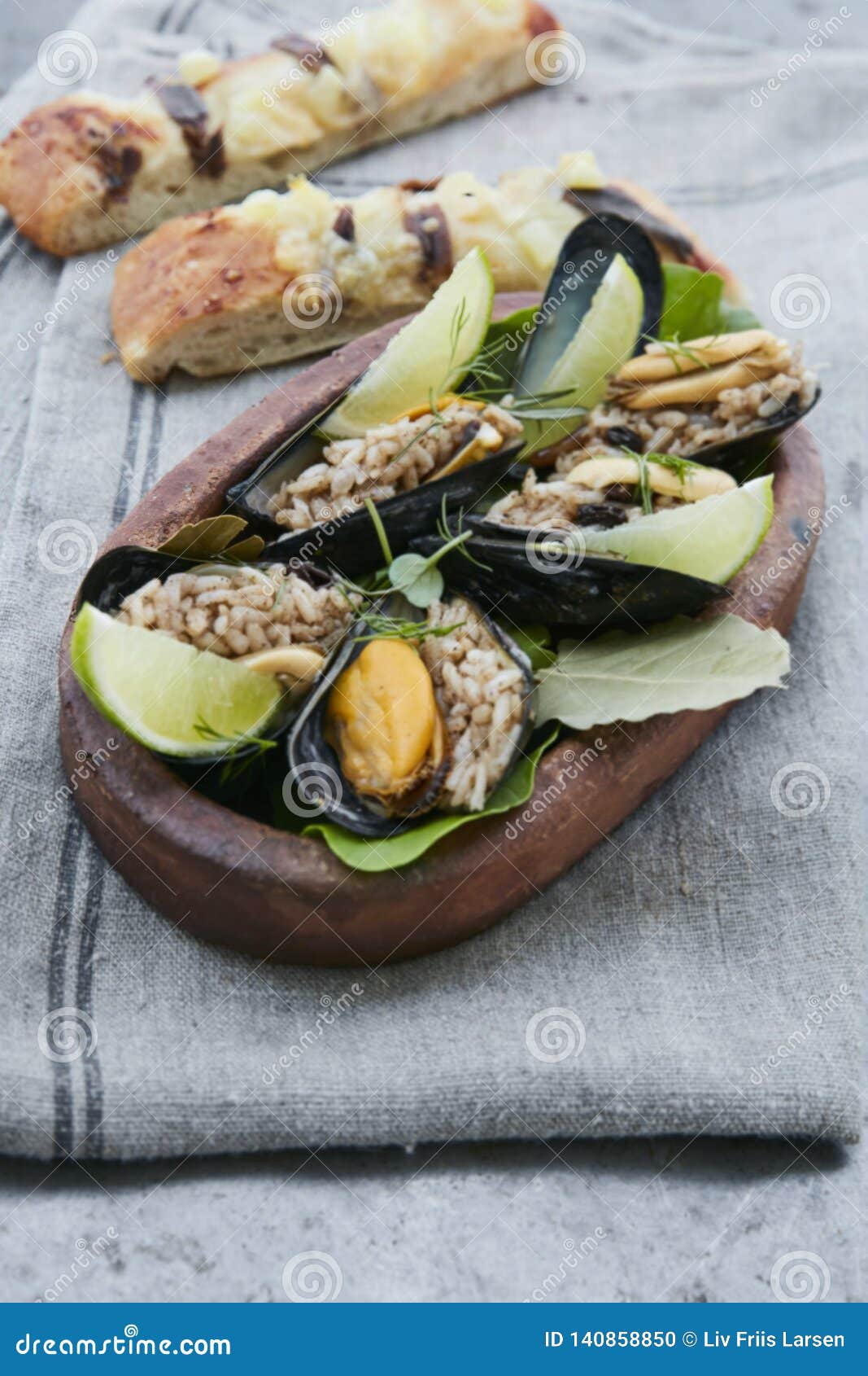 Mussels with rice and lime stock photo. Image of rice - 140858850