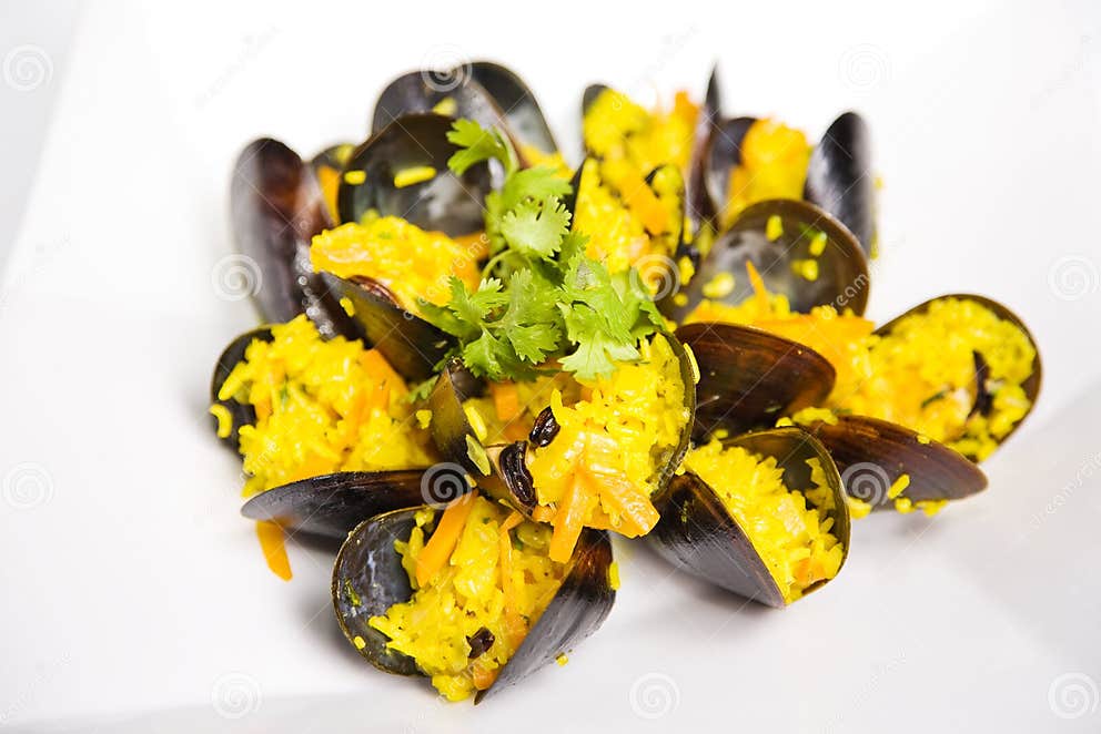 Mussels Stuffed with Rice on the White Plate Stock Photo - Image of ...