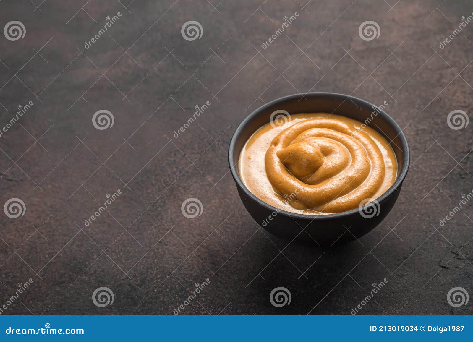 Mustard in a Cup Close-up on a Brown Concrete Table Stock Photo - Image ...