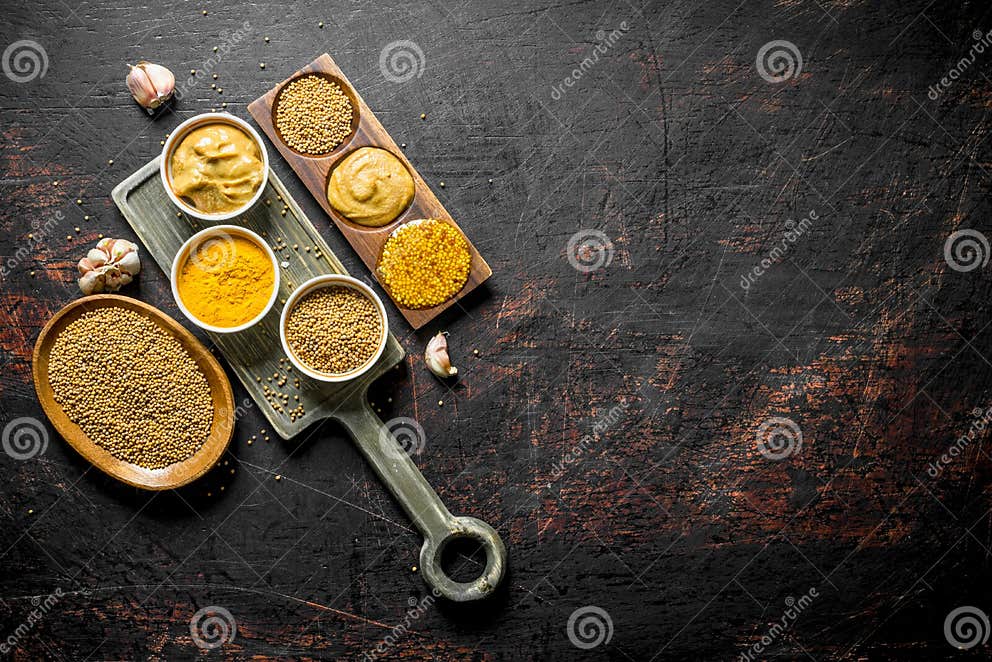 Mustard in a Plate, on a Cutting Board and a Stand Stock Photo - Image ...