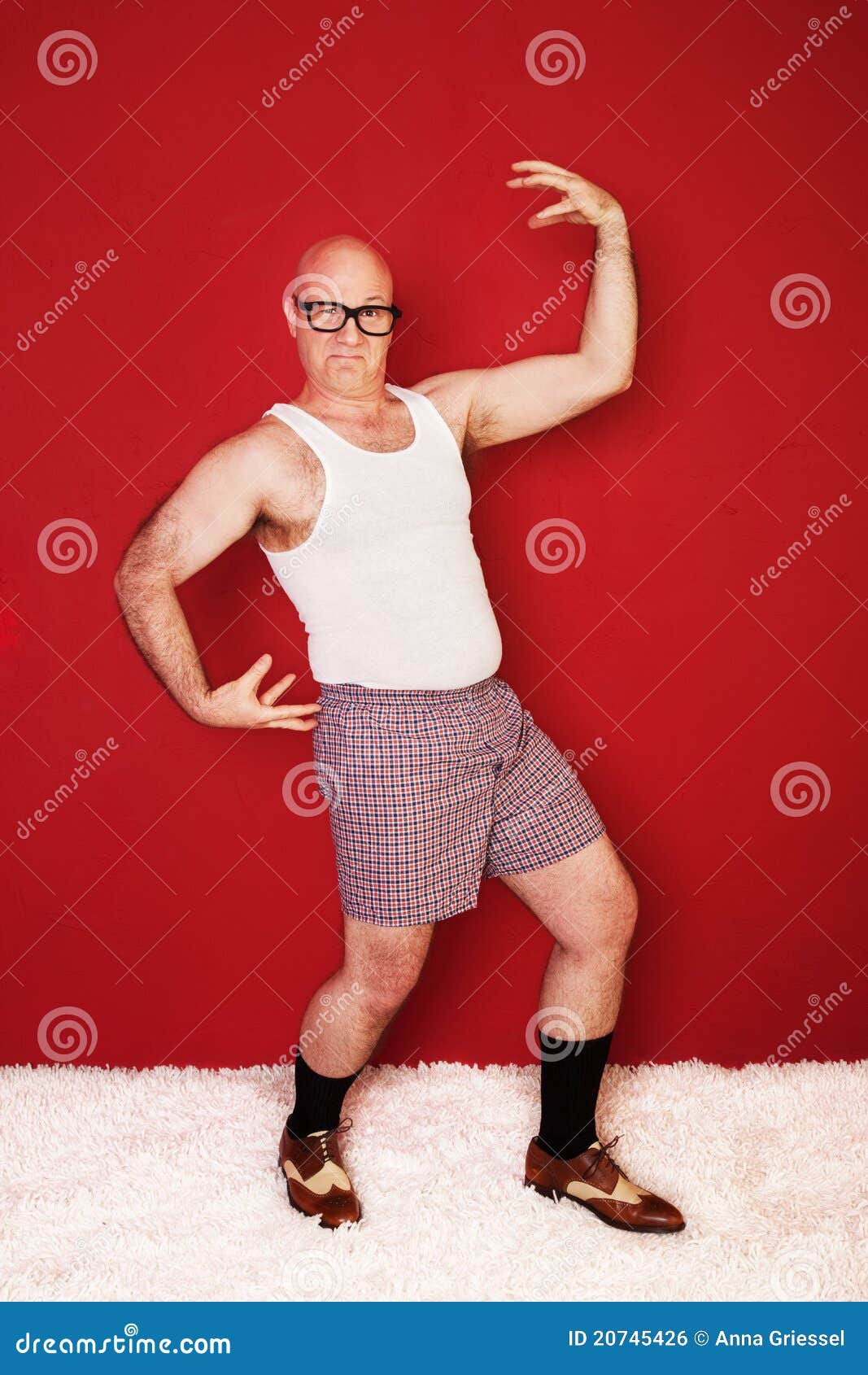 Musular Buffoon stock photo. Image of emotion, maroon - 20745426