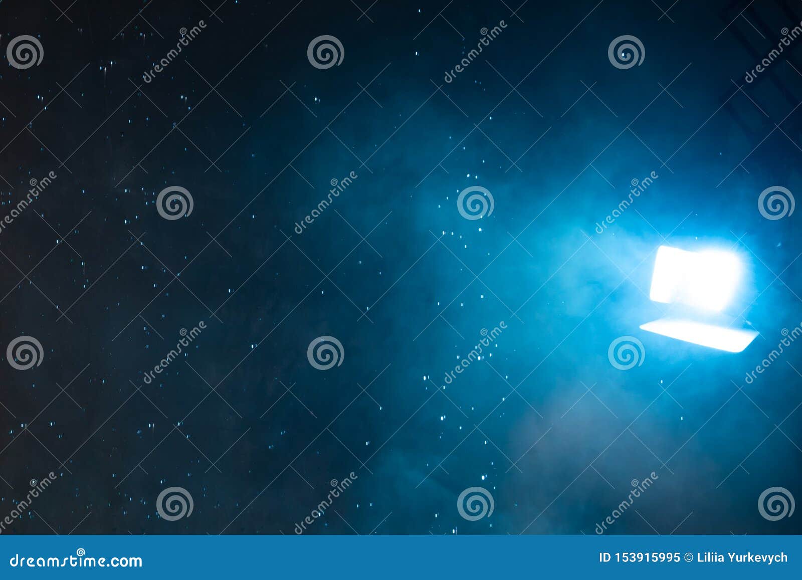 Muted Blue Light Passes through the Rain and Fog. Stock Image - Image ...