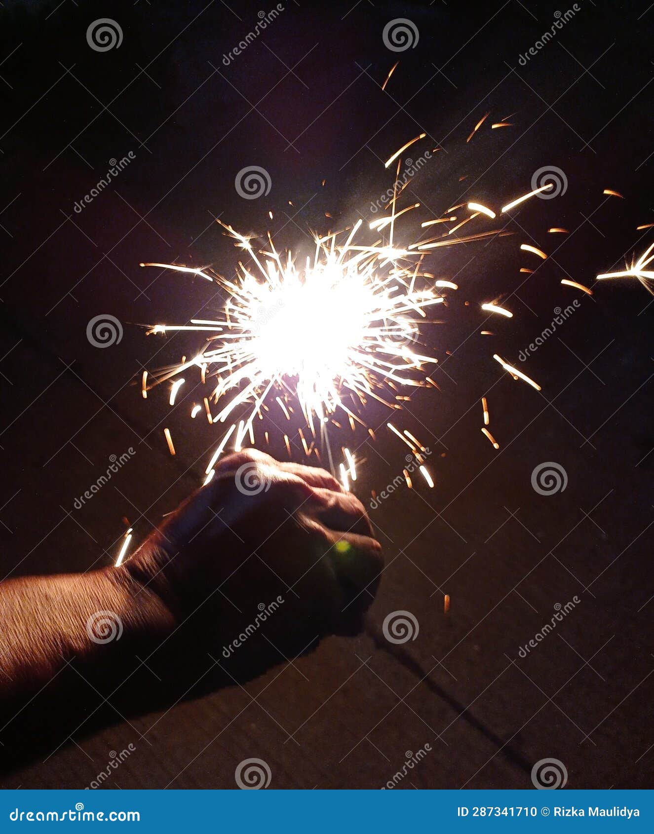 My Father Holding Fireworks with Hand in the Night Stock Photo - Image ...
