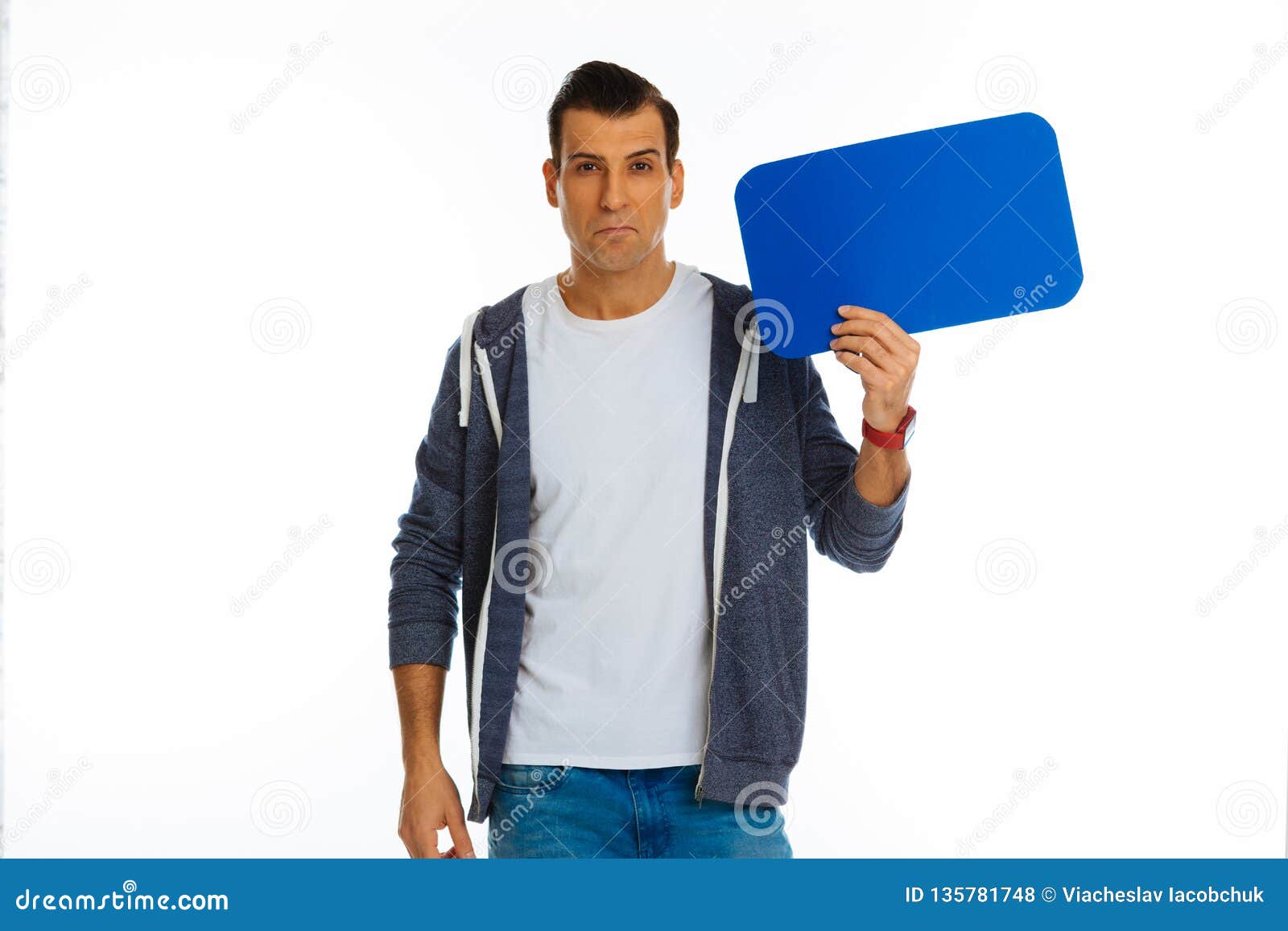 Joyful Positive Man Holding a Sign with an Inscription Stock Photo ... Joyful Positive Man Holding a Sign with an Inscription Stock Photo ...