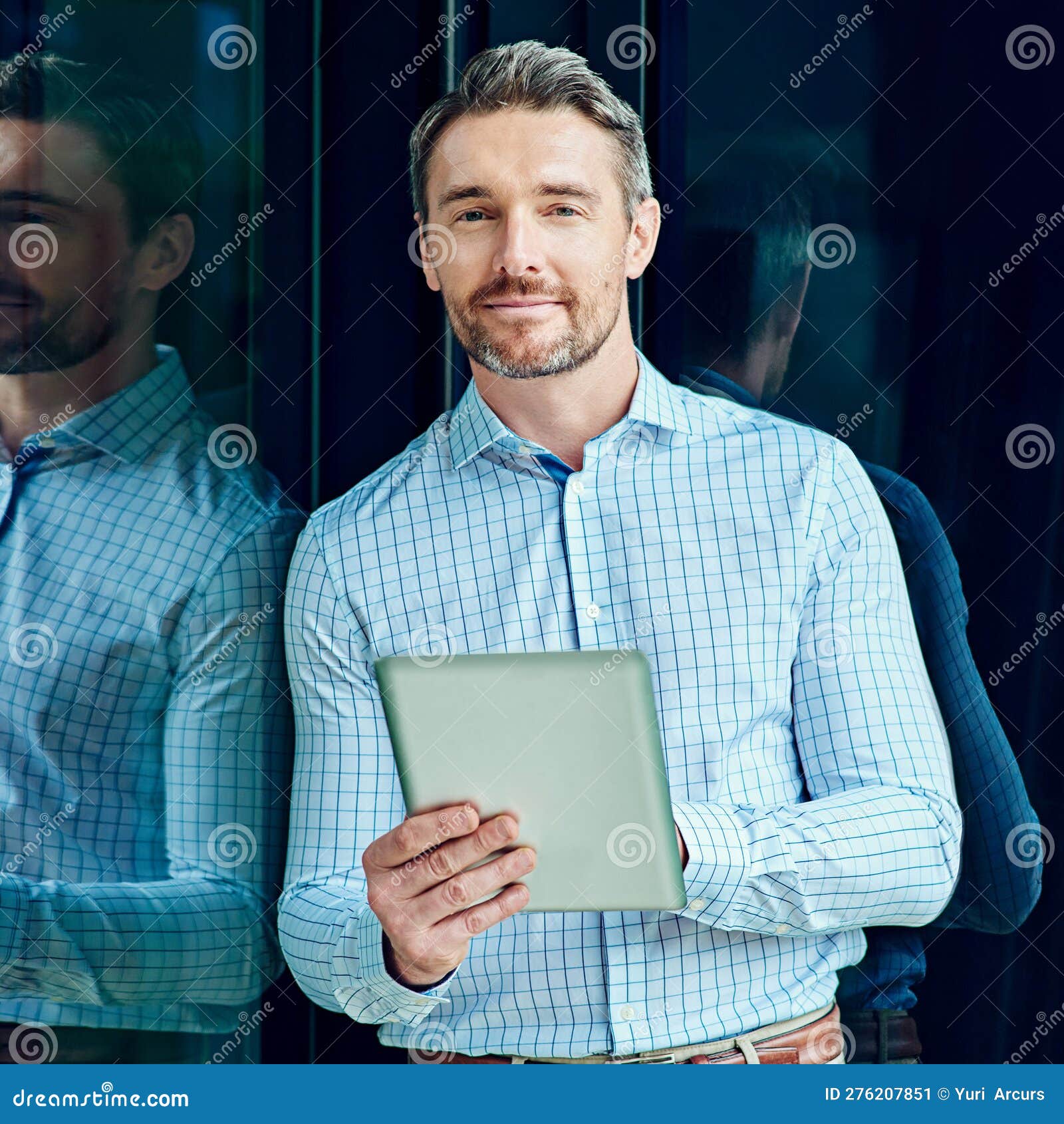 My Tablet is Virtually a Digital Desk. Portrait of a Businessman Using ...