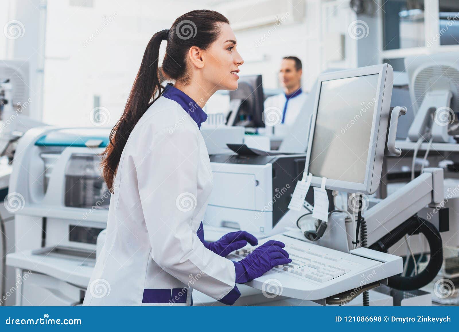 Attentive Lab Assistant Working at Computer Stock Photo - Image of ...