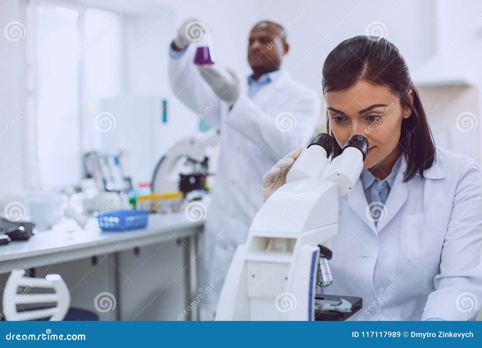 Experienced Researcher Looking into the Microscope Stock Image - Image ...