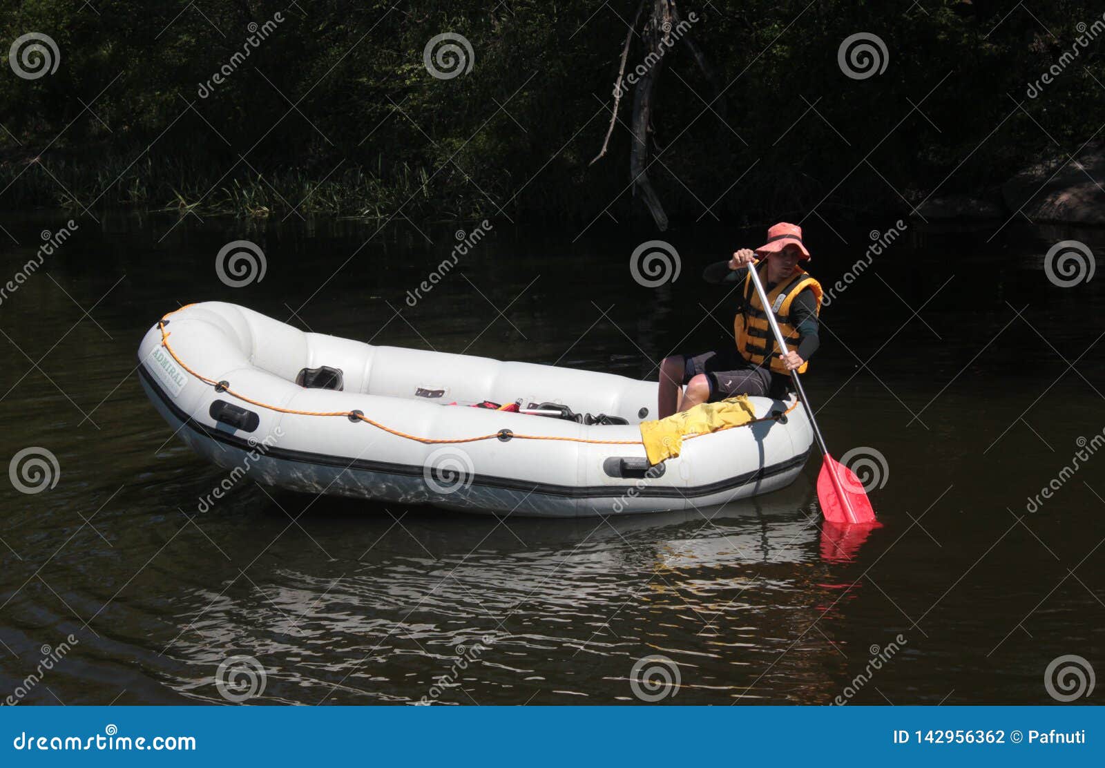 Experienced Guide Swims on a White Raft Alone on the River. Editorial ...