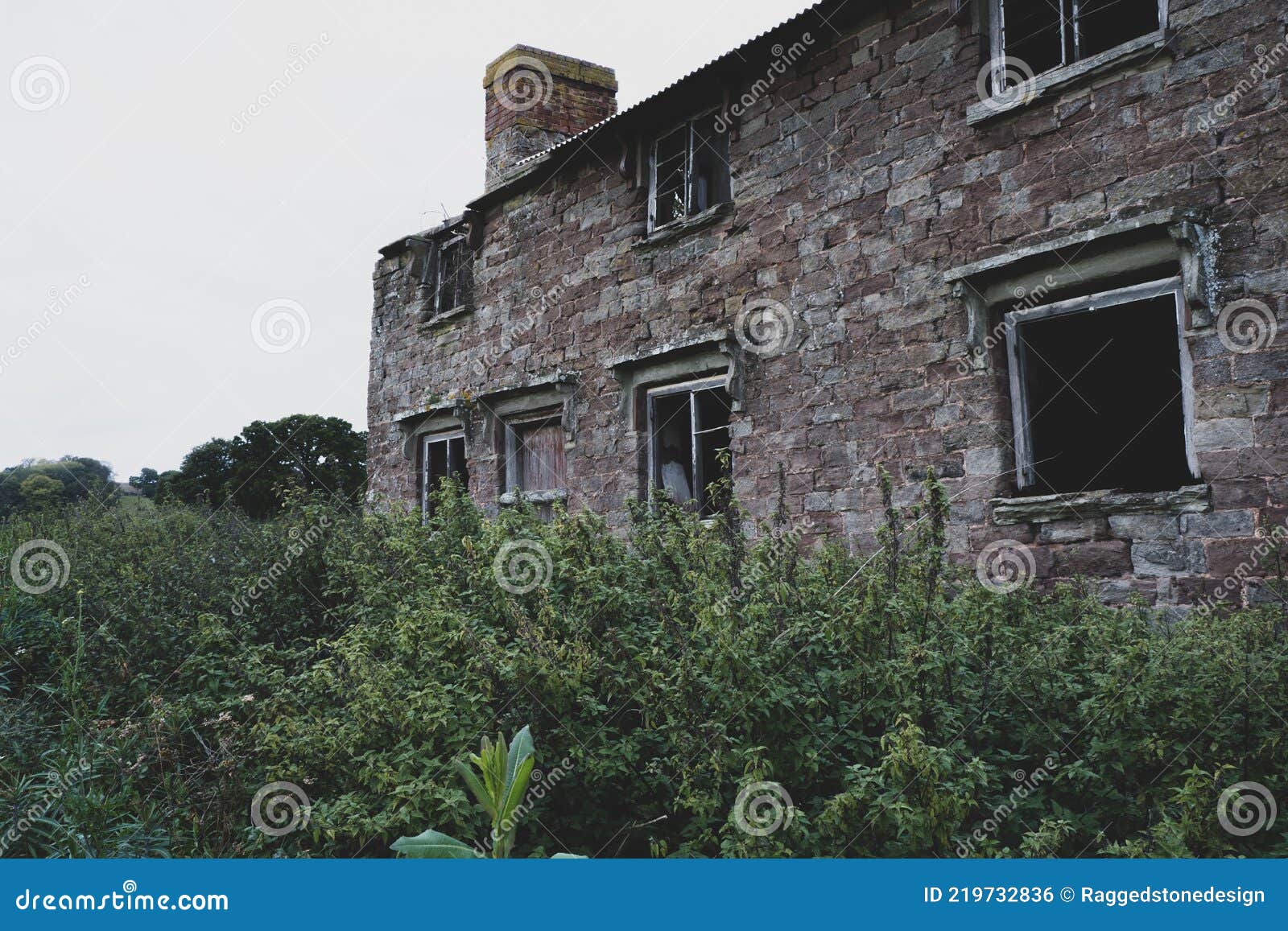 A Mysterious, Abandoned, Ruined Home. with Empty Window Frames and ...