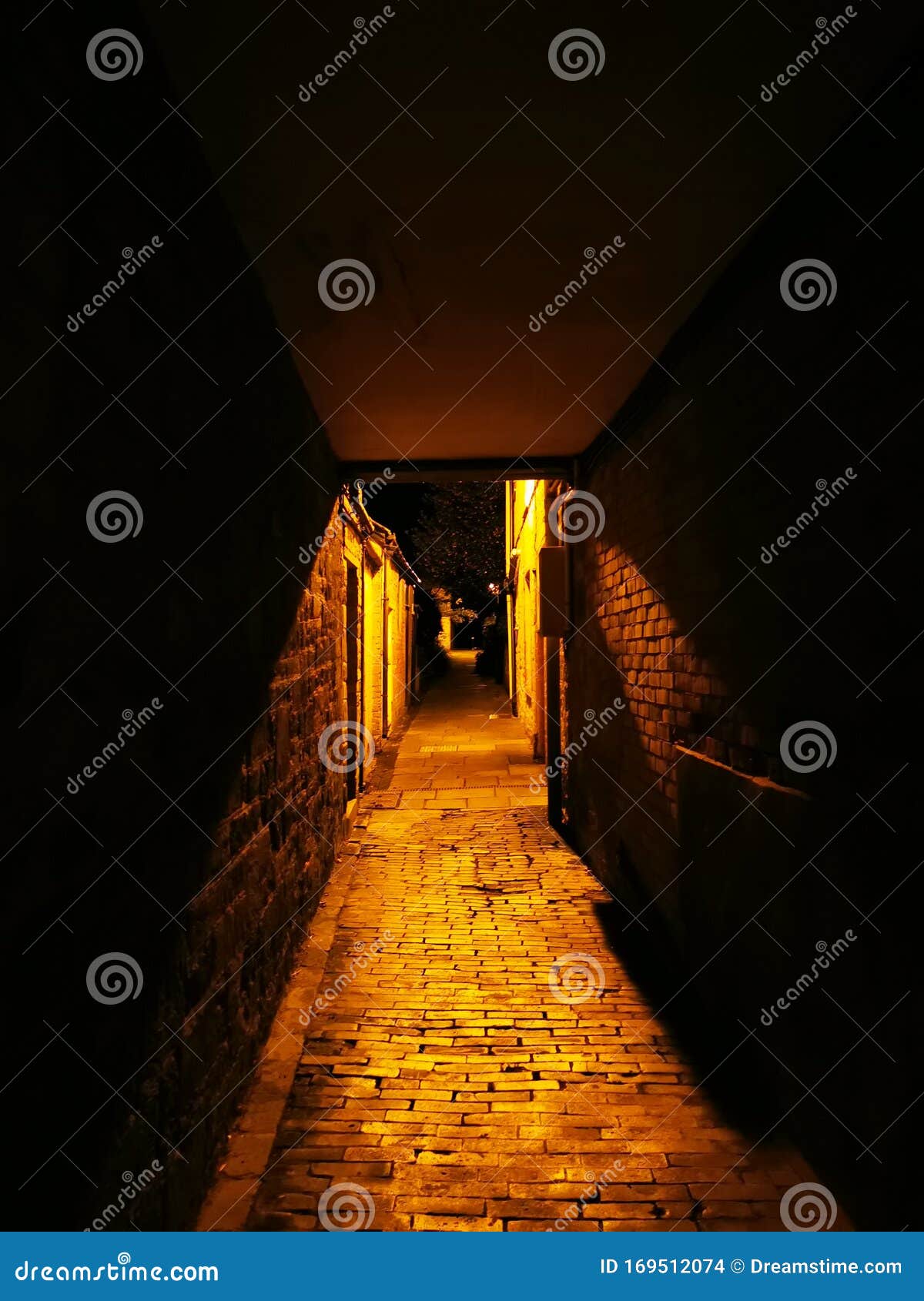 Mysterious Dim Lit Alleyway Stock Photo - Image of streetlamp, path ...