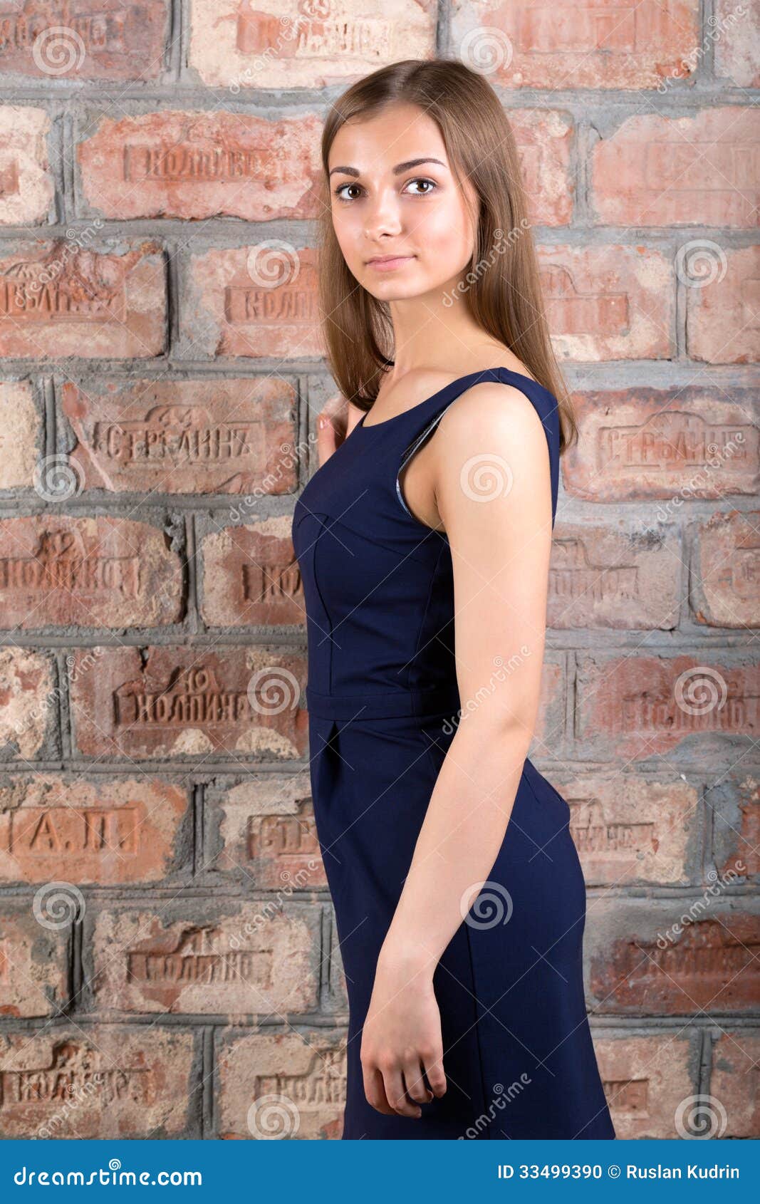 Mysterious Girl Against a Brick Wall Stock Photo - Image of looking ...