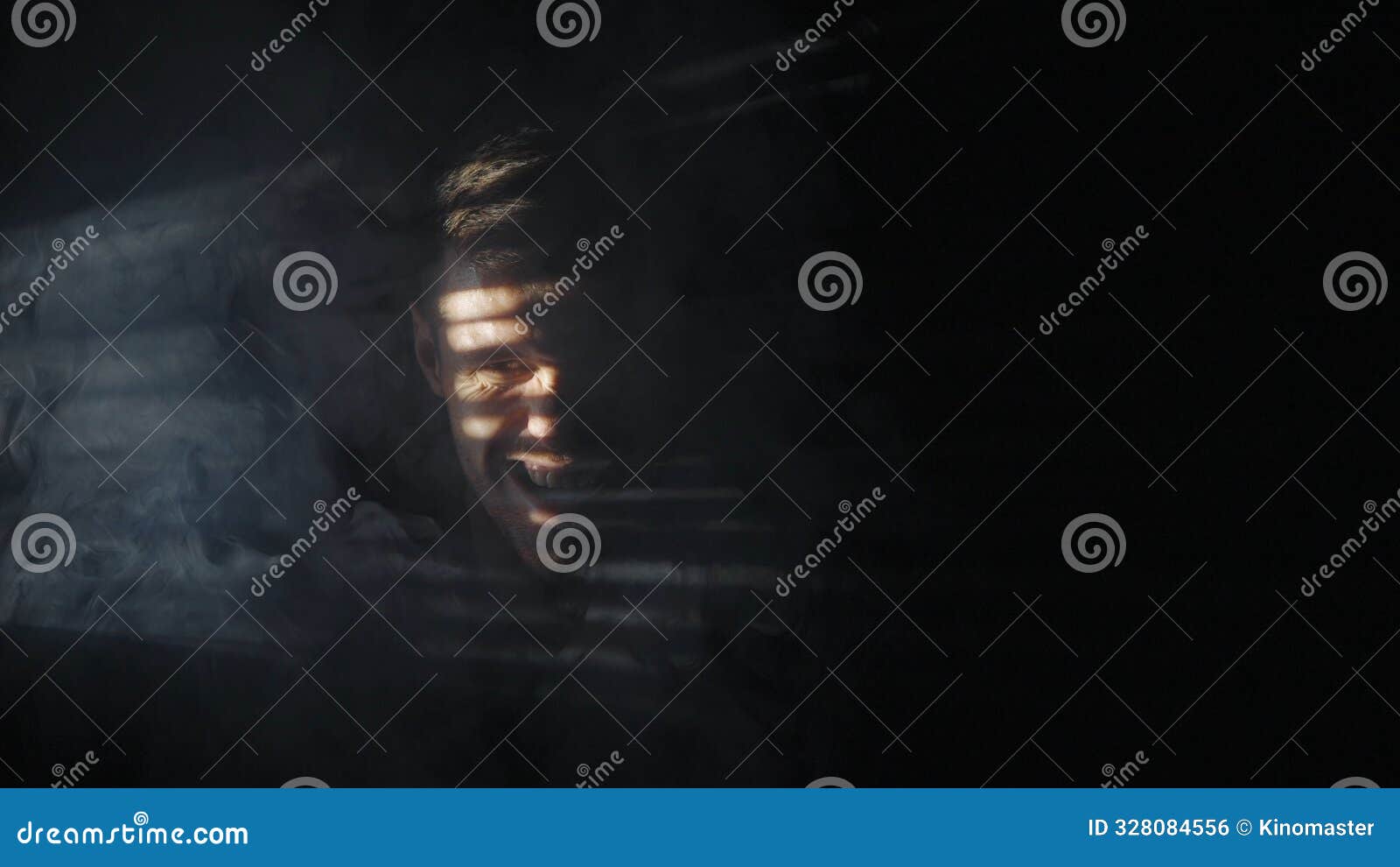 Mysterious Portrait of Man with Light and Shadow on Face Stock Photo ...