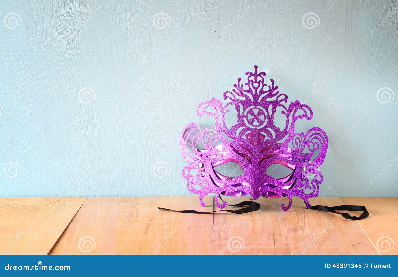 Mysterious Venetian Masquerade Mask on Wooden Table Stock Image - Image ...