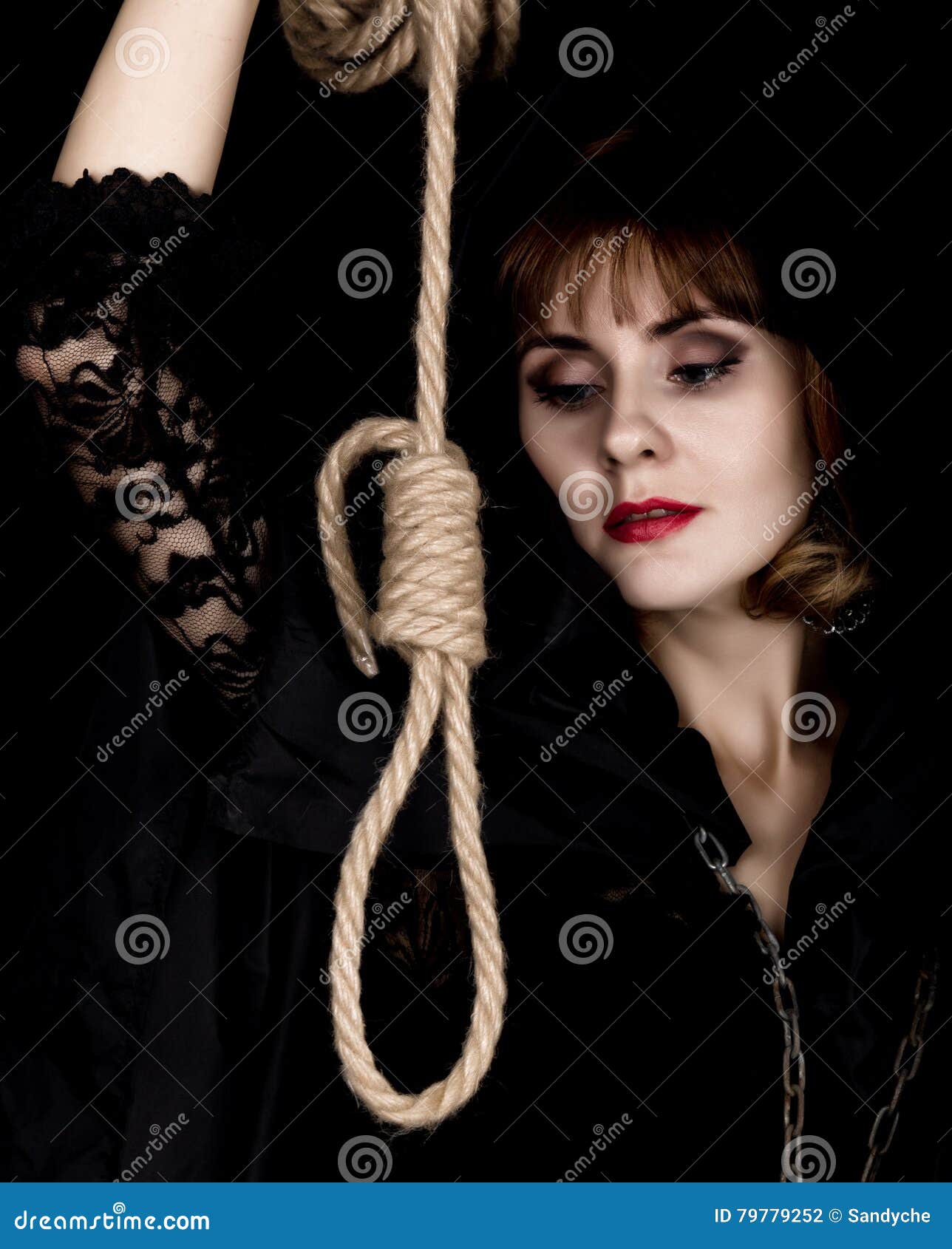 Mysterious Young Woman Holding Loop of the Rope. on a Dark Background ...