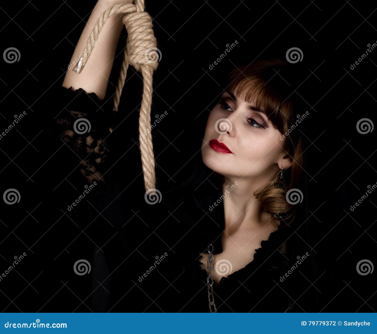 Mysterious Young Woman Holding Loop of the Rope. on a Dark Background ...