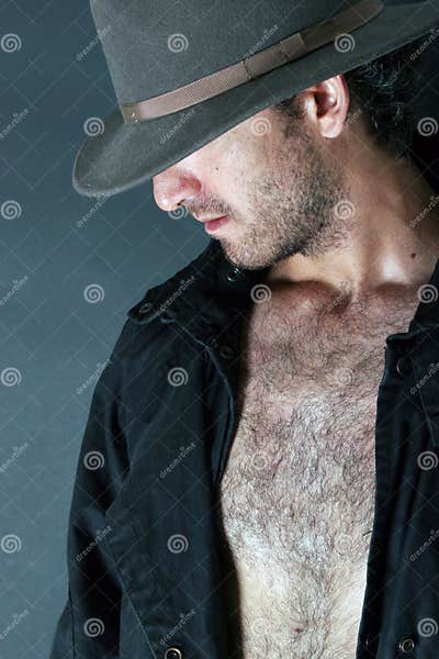 Mystery Man Hiding His Face Under a Hat Stock Photo - Image of gangster ...