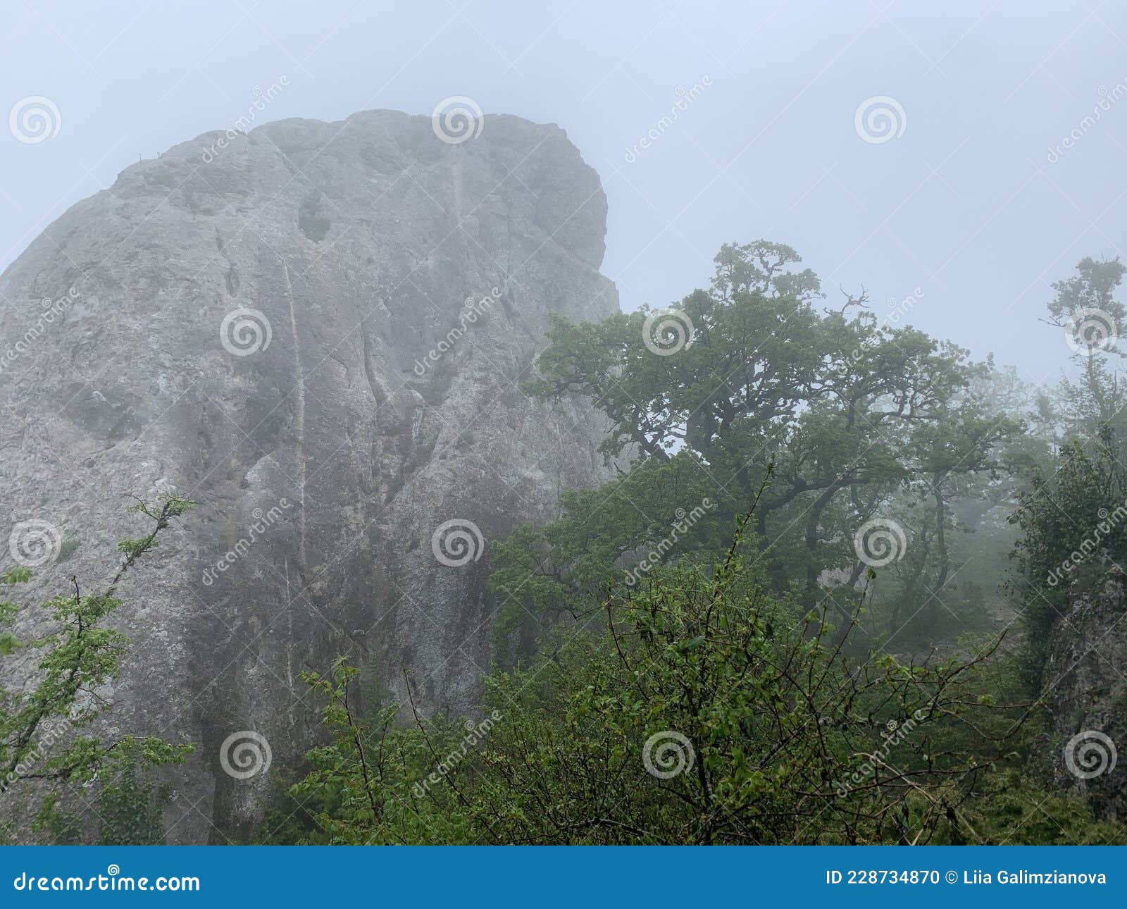 Mystic rocks and cliffs stock photo. Image of high, cloudy - 228734870