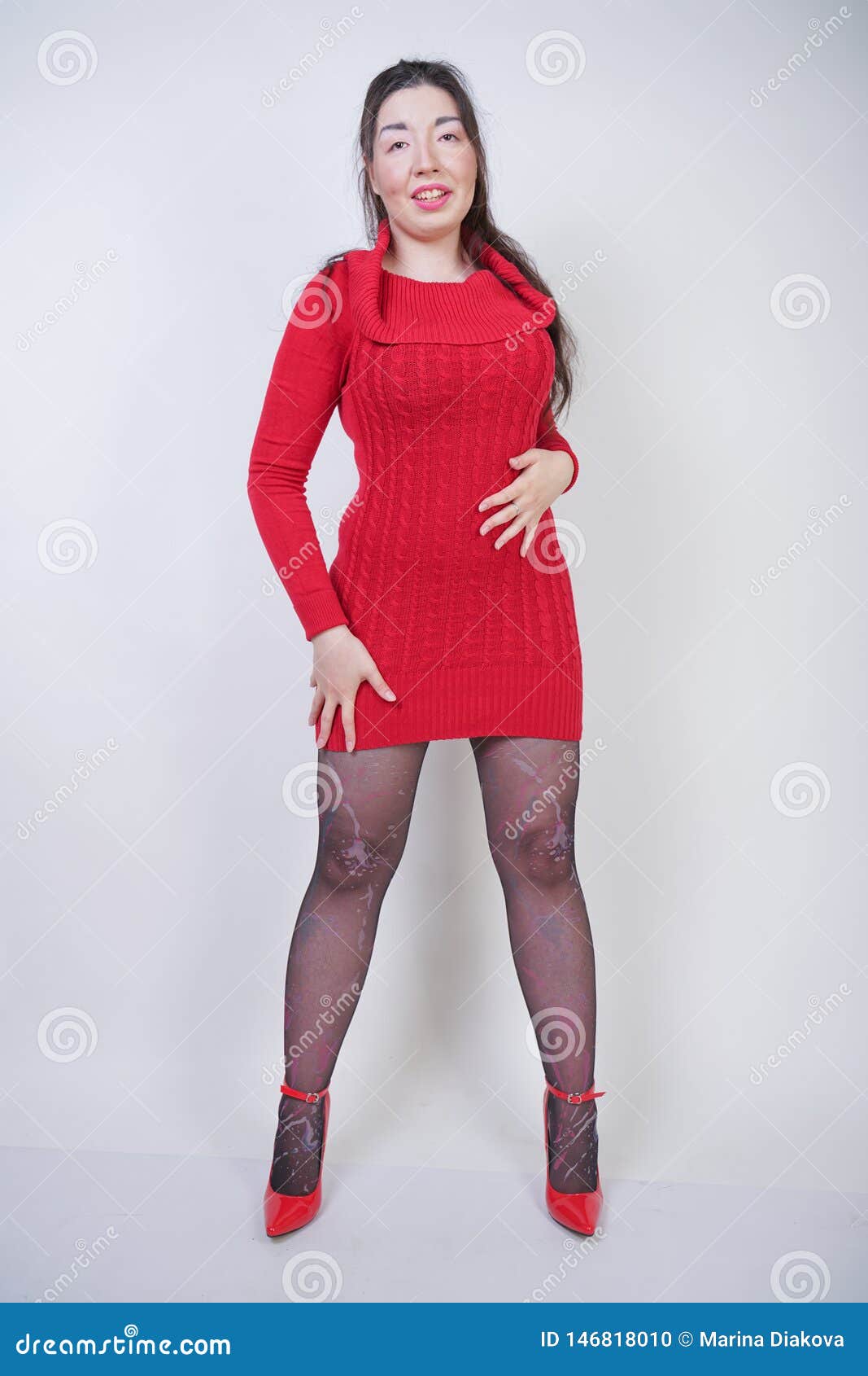 Pretty Asian Chubby Woman Posing In Red Knitted Dress And Black