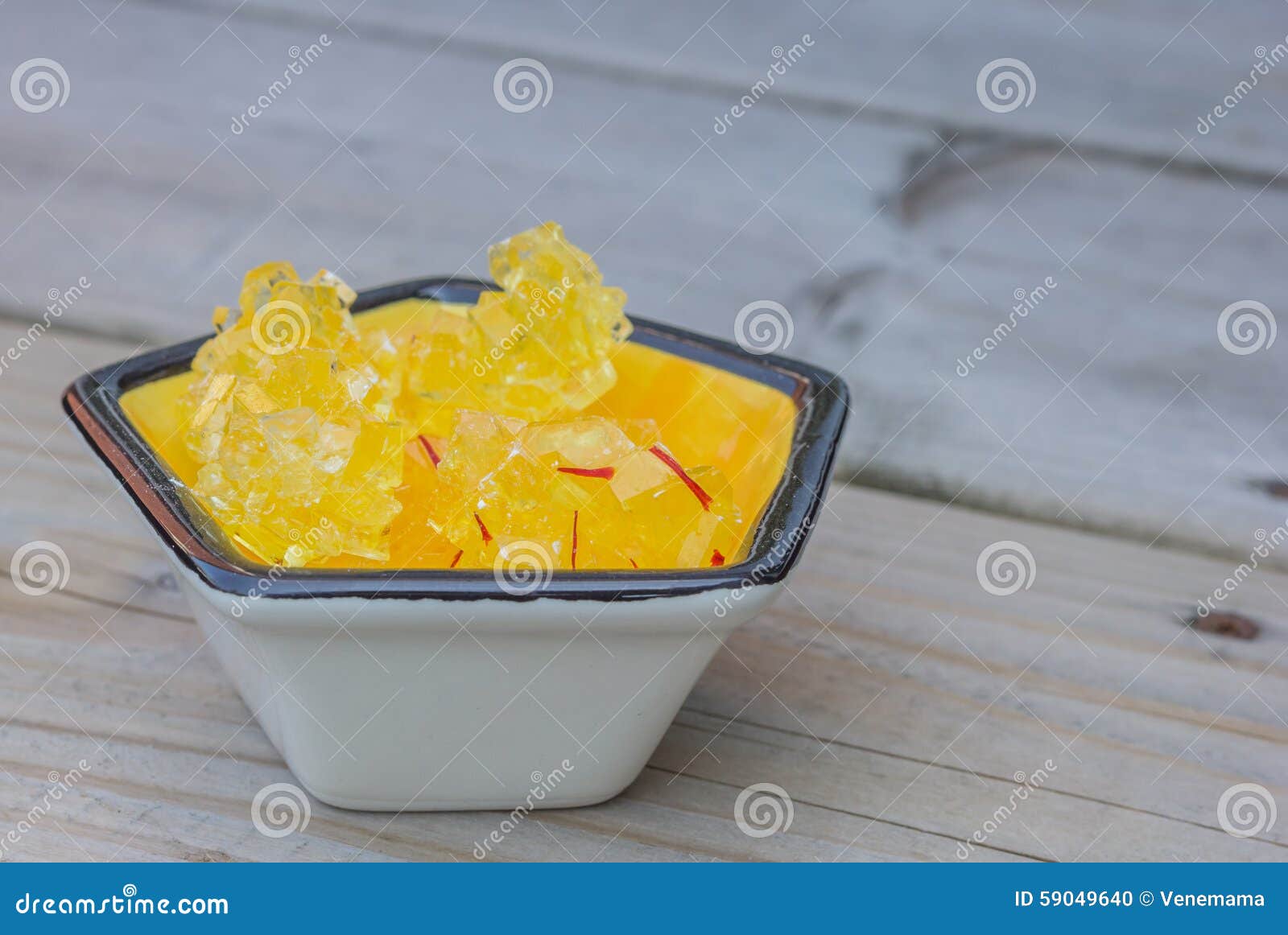 Nabat, Saffron Enhanced Crystallized Sugar on a Wooden Table Stock ...