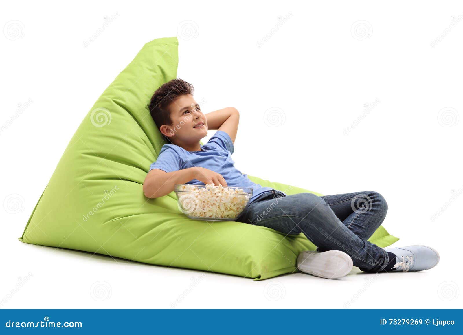 Nachdenklicher Junge, Der Auf Einem Sitzsack Sitzt Stockbild - Bild von ...