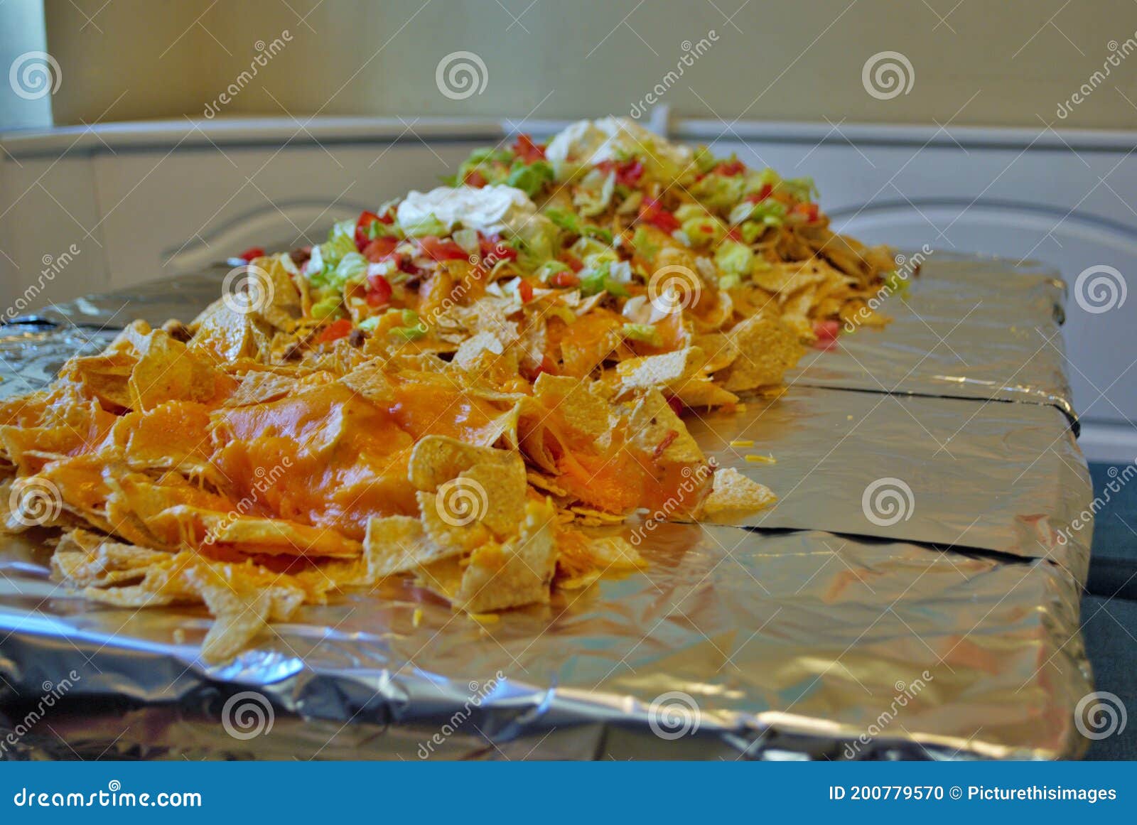 Nacho Table Kitchen Table Wrapped in Aluminum Foil and Covered with ...