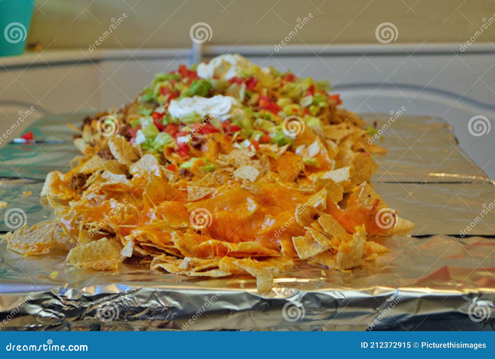 Nacho Table Kitchen Table Wrapped in Aluminum Foil and Covered with ...