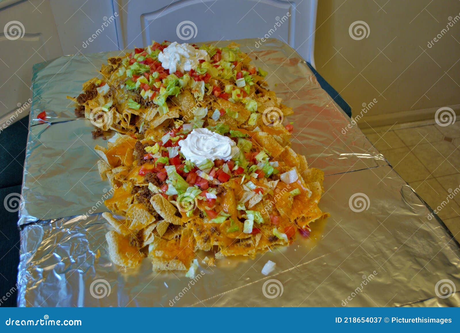 Nacho Table Kitchen Table Wrapped in Aluminum Foil and Covered with ...