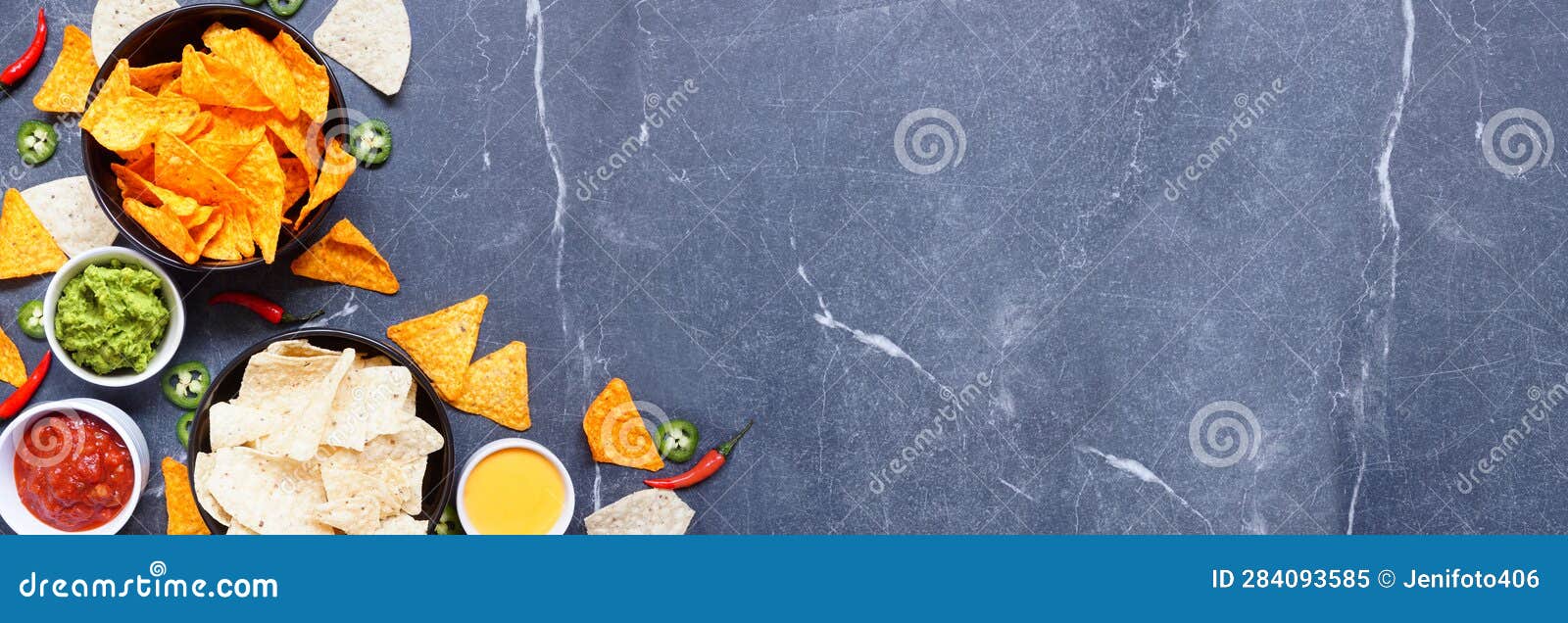 Nachos and Dip Corner Border Over a Dark Stone Banner Background Stock ...