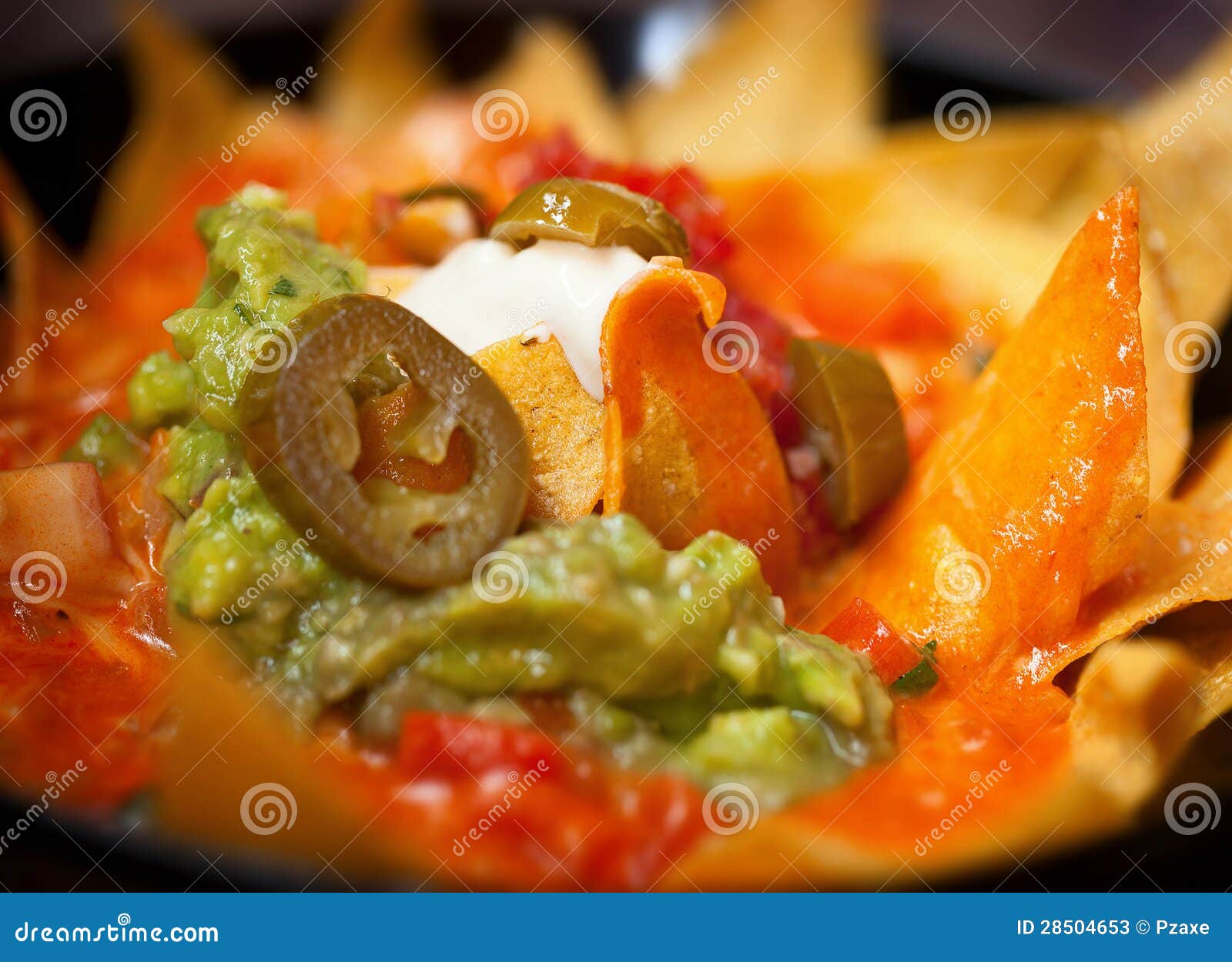 Nachos with Salsa Verde and Olives Stock Image - Image of meal, macro ...