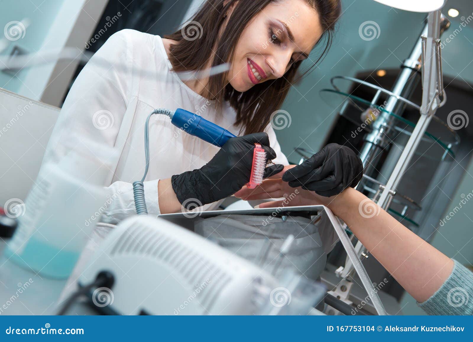 Nail Master Manicures Nails in a Beauty Salon Stock Photo - Image of ...