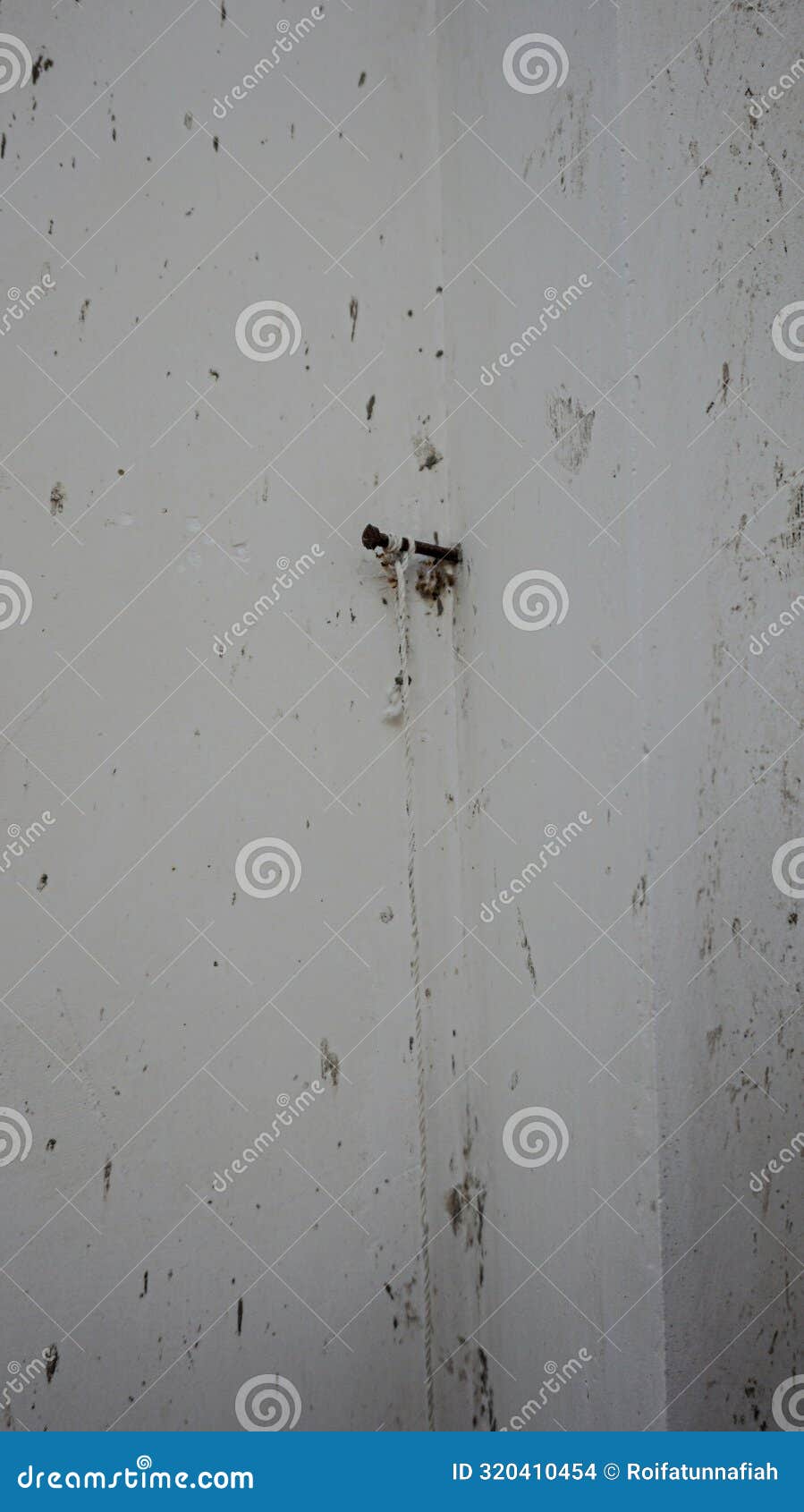 A Nail Stuck in a Building Wall. Stock Photo - Image of nail, line ...