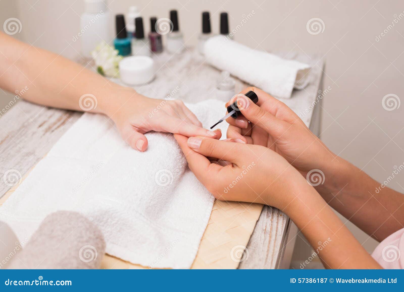 Nail Technician Giving Customer a Manicure Stock Image - Image of towel ...