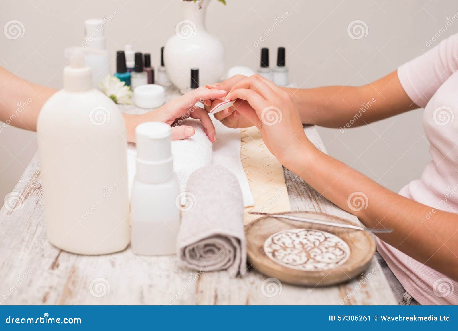 Nail Technician Giving Customer a Manicure Stock Image - Image of ...