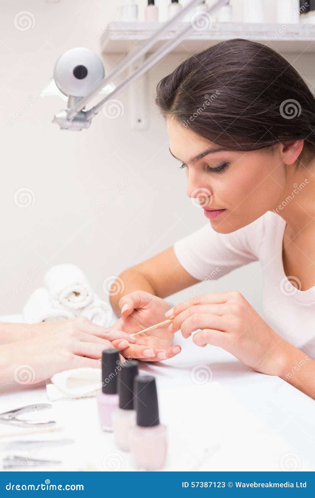Nail Technician Giving Customer a Manicure Stock Image - Image of ...