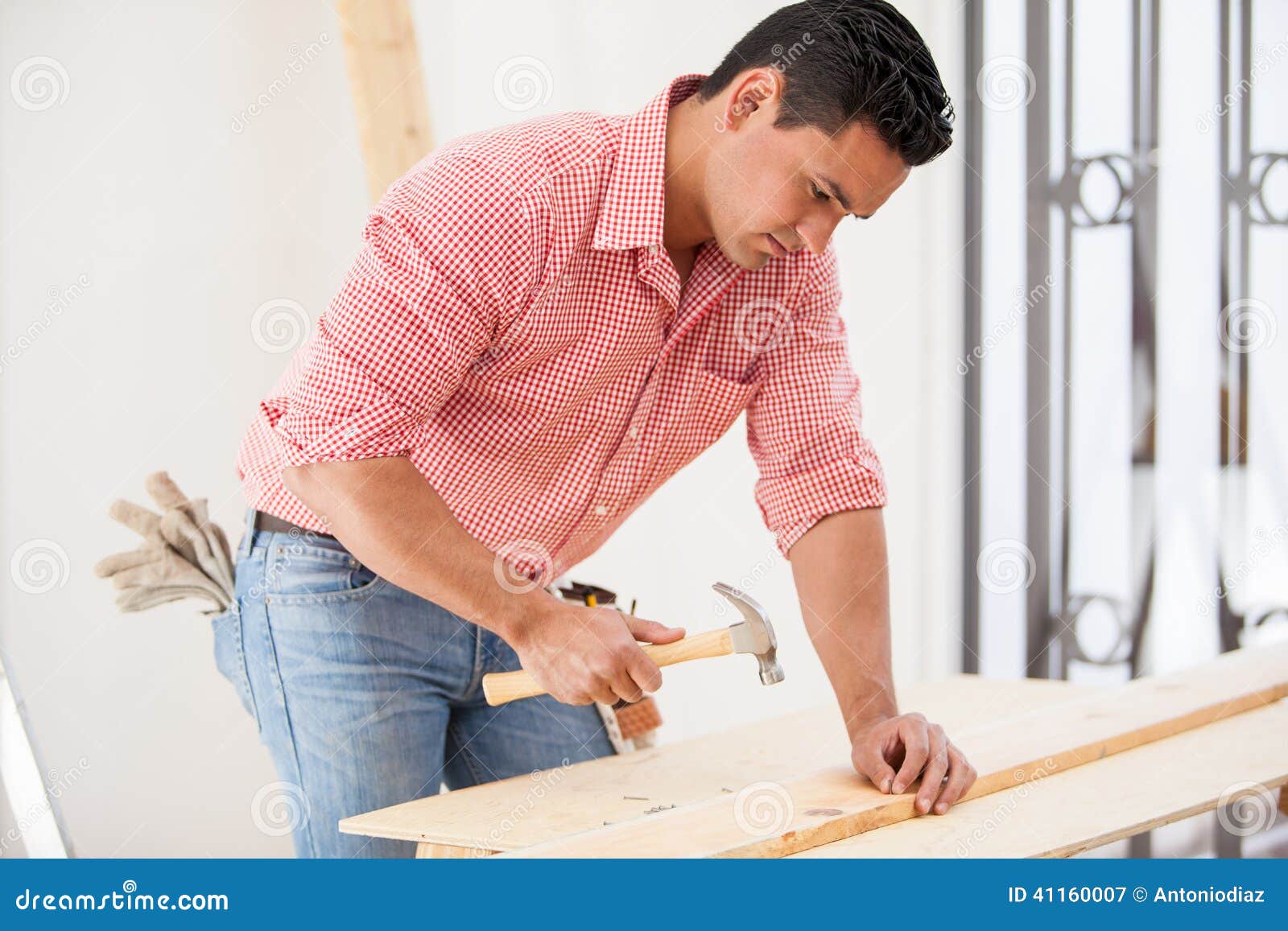 Nailing Down Wood with a Hammer Stock Image - Image of copy ...